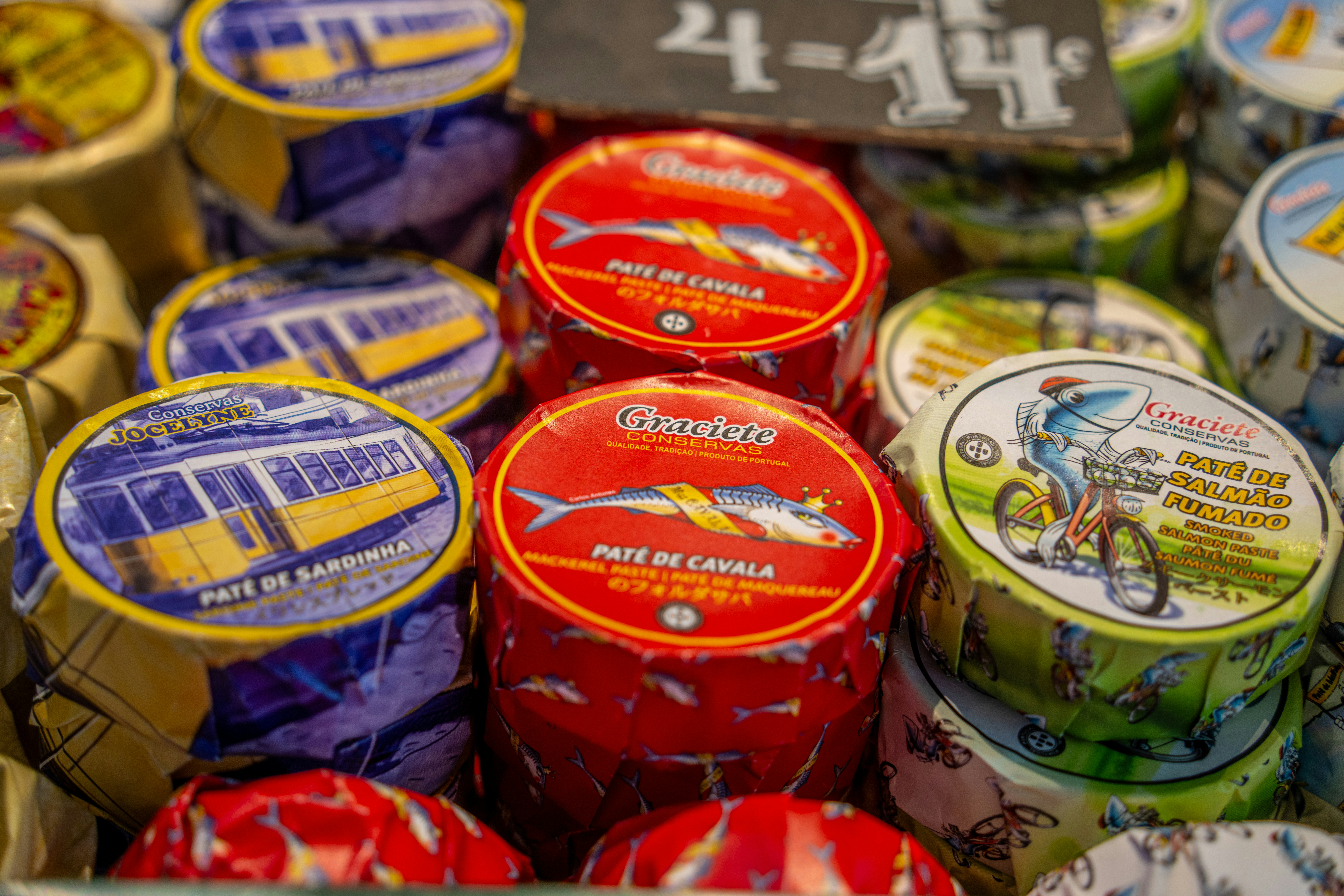 Cylindrical Custards: A Colorful Stack of Labeled Tins