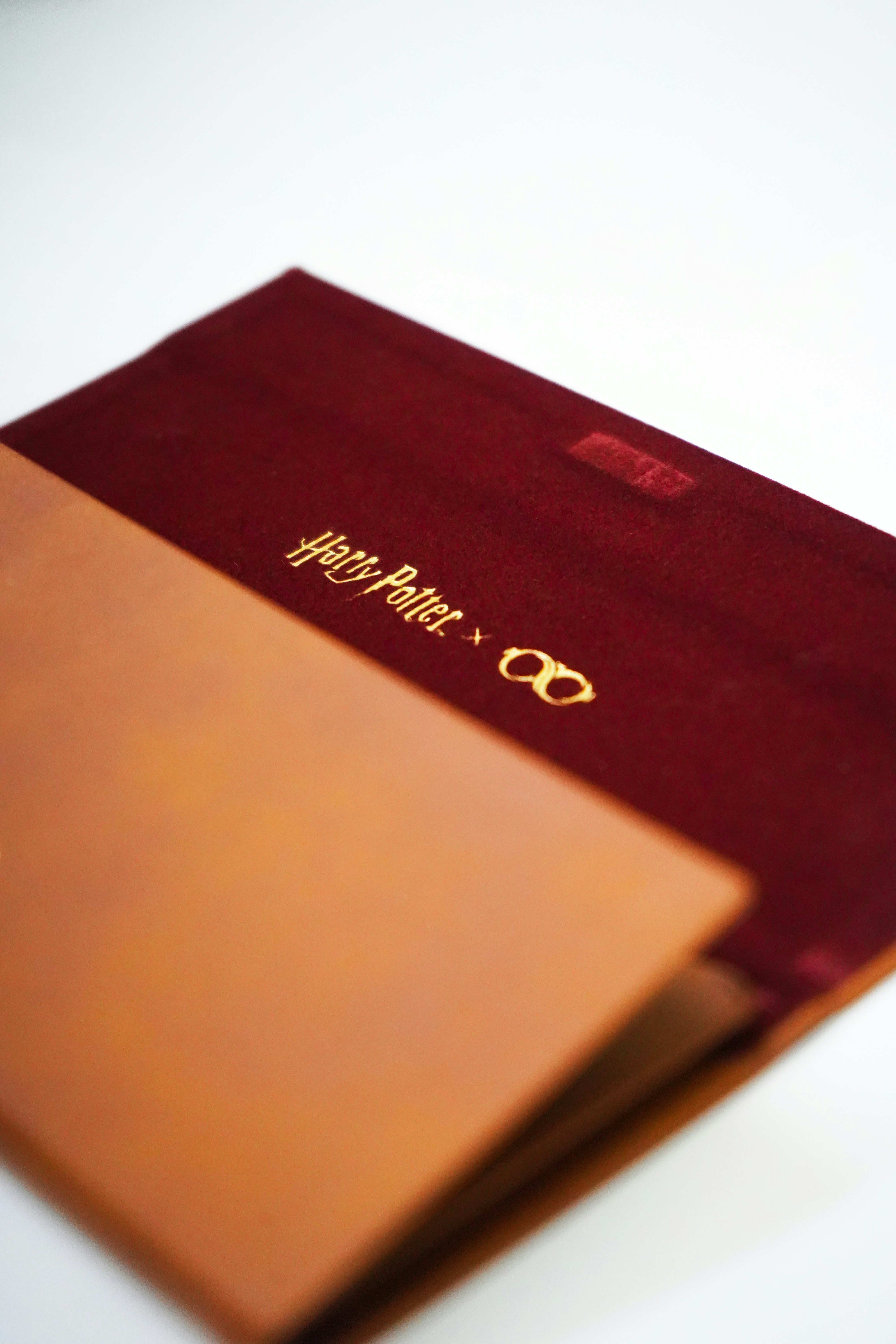 Harry Potter leather-bound journal with gold embossed logo