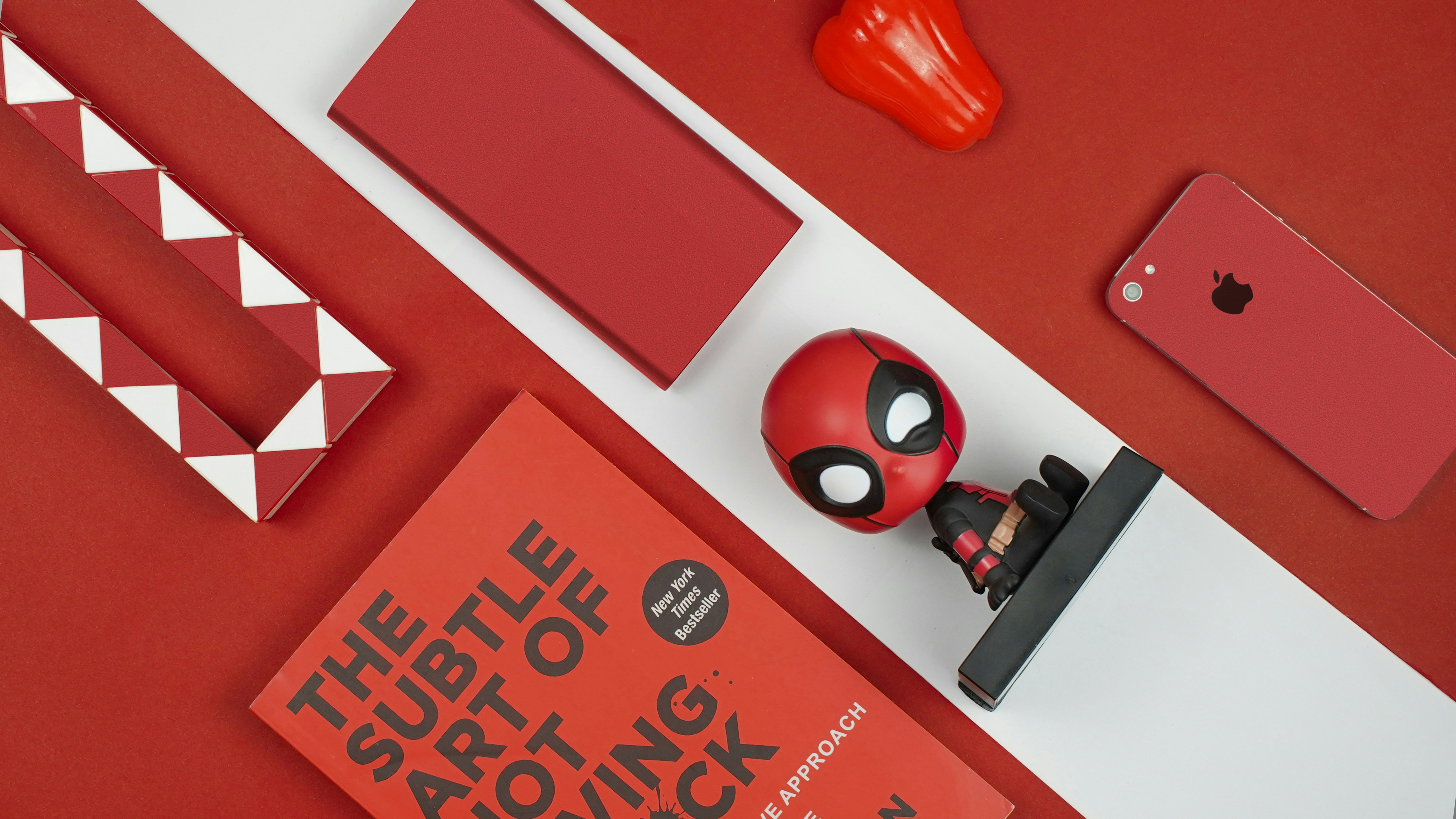 Crimson Studio: A Red-Themed Scene with The Subtle Hero