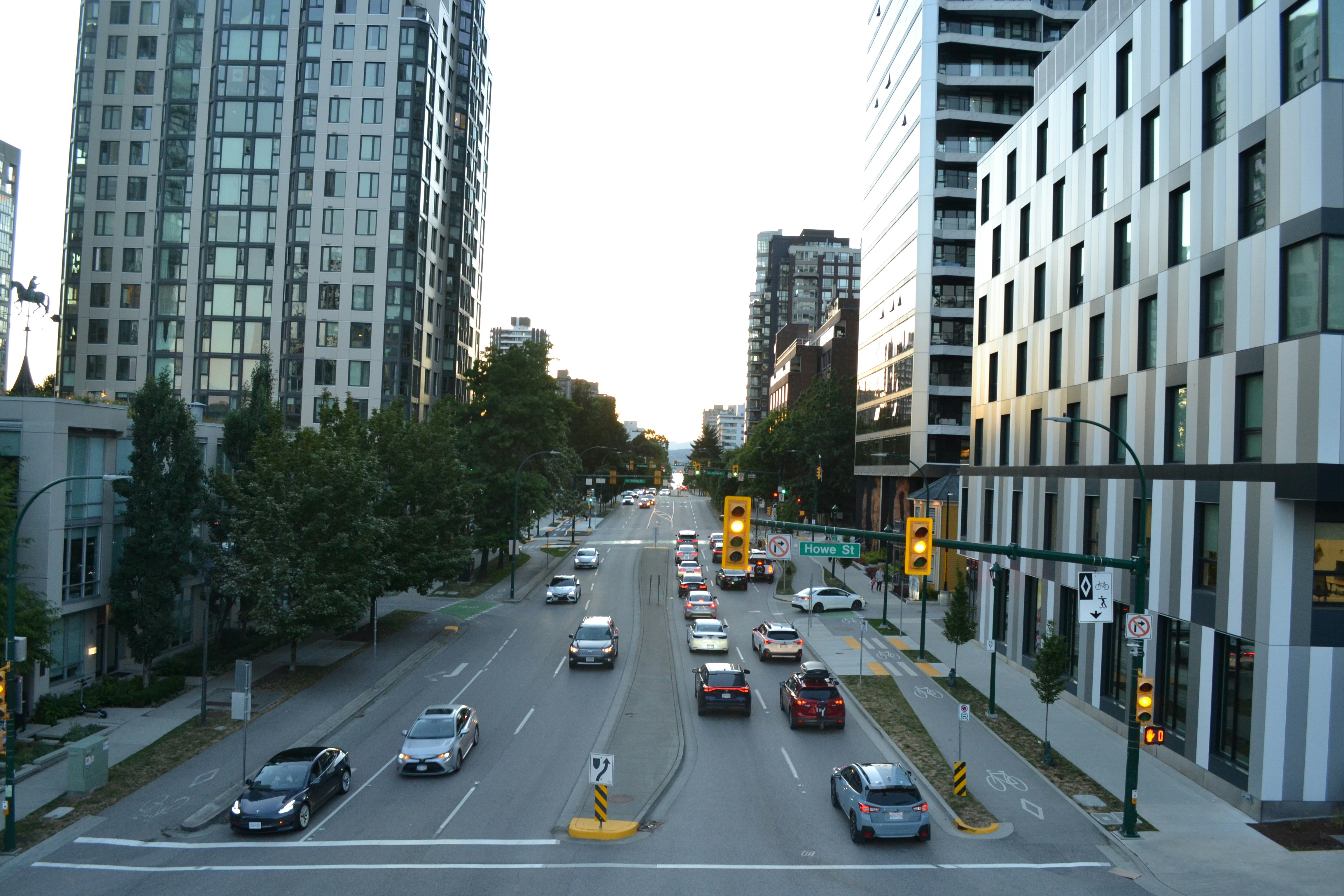 Urban Corridor: A Busy City Street Descending into the Horizon