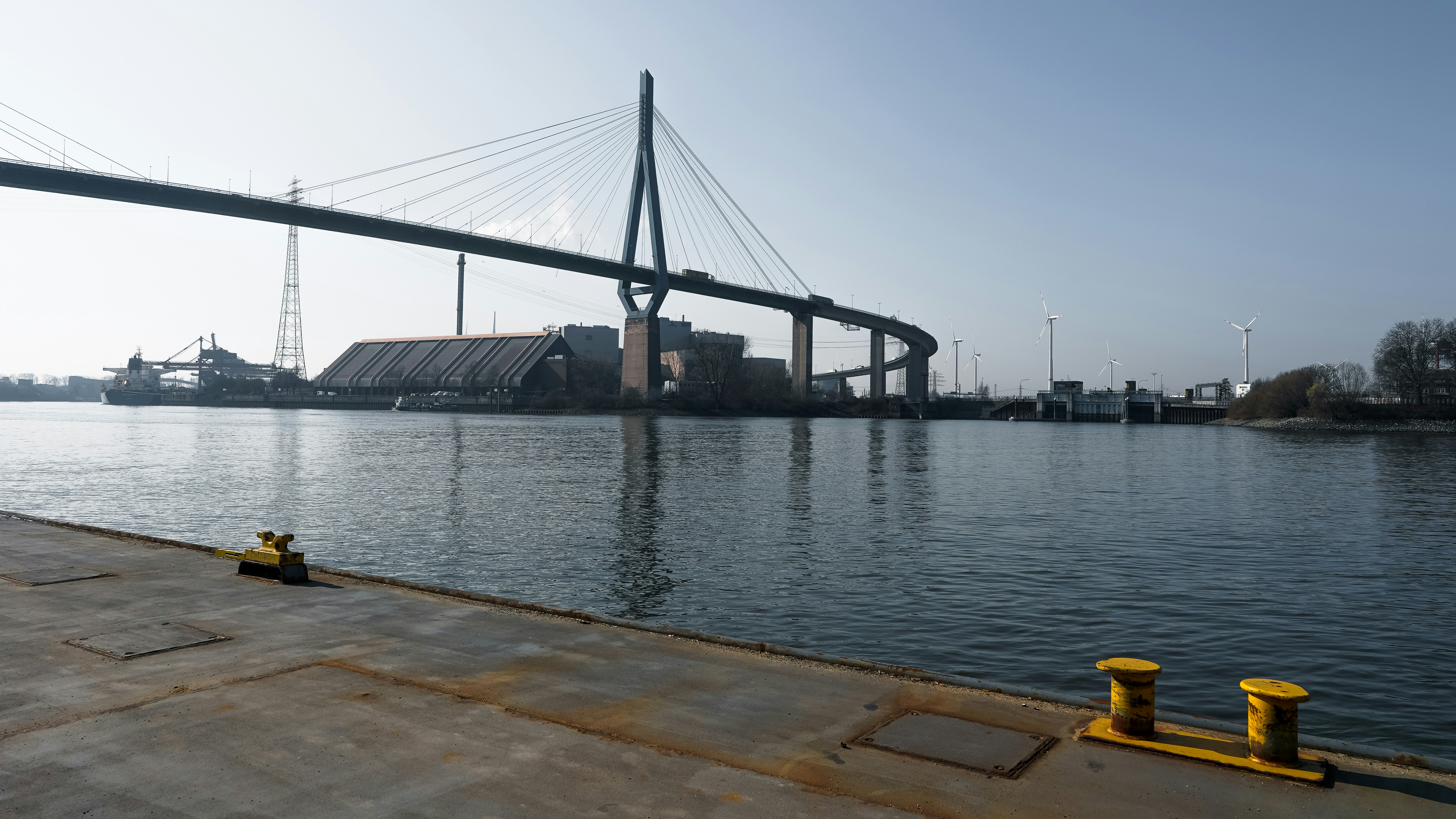 Bridge over Calm Waters: A Vessel-Friendly Port at Dusk