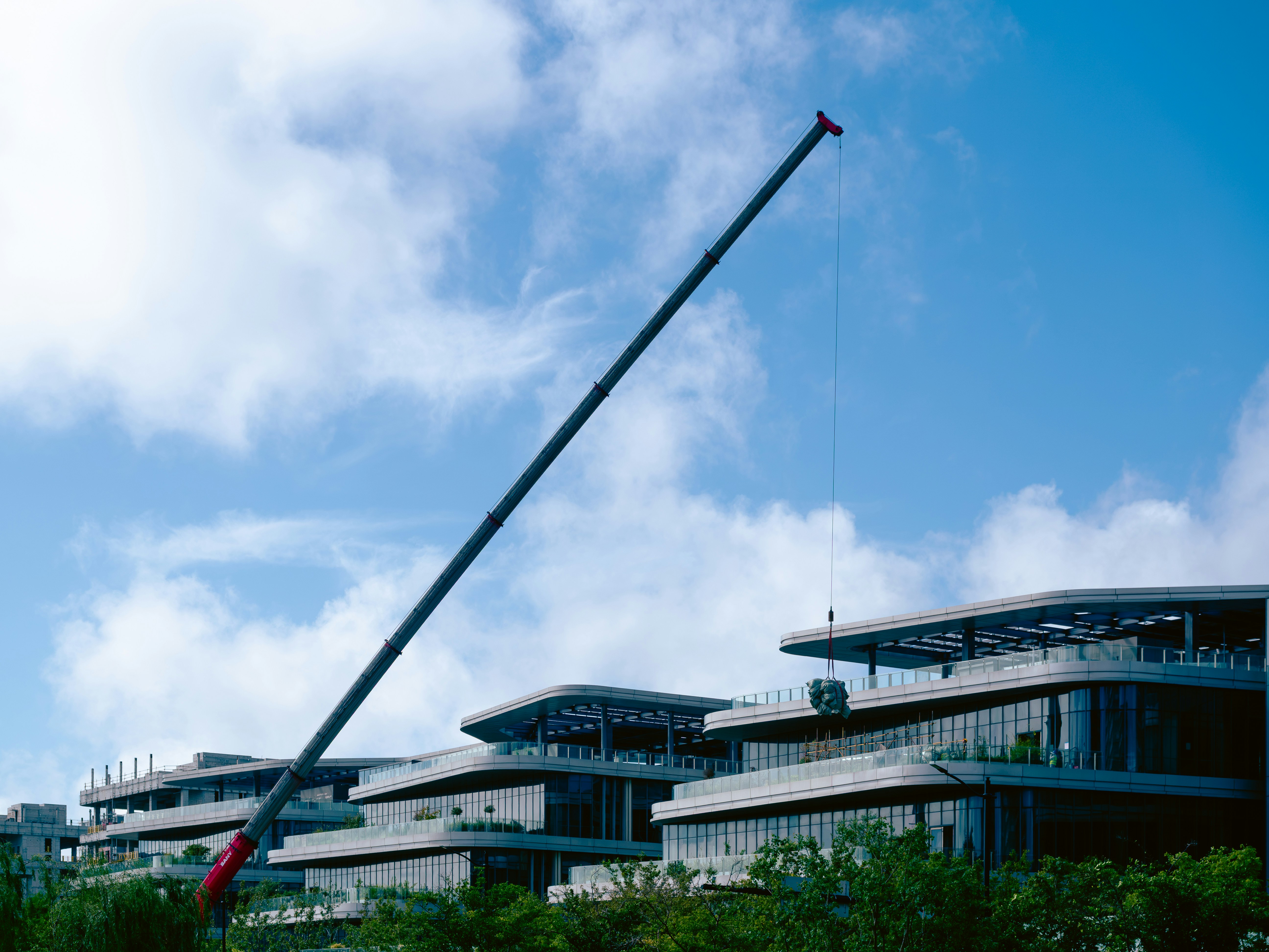 Crane's Reach Over Modern Goodwin Campus