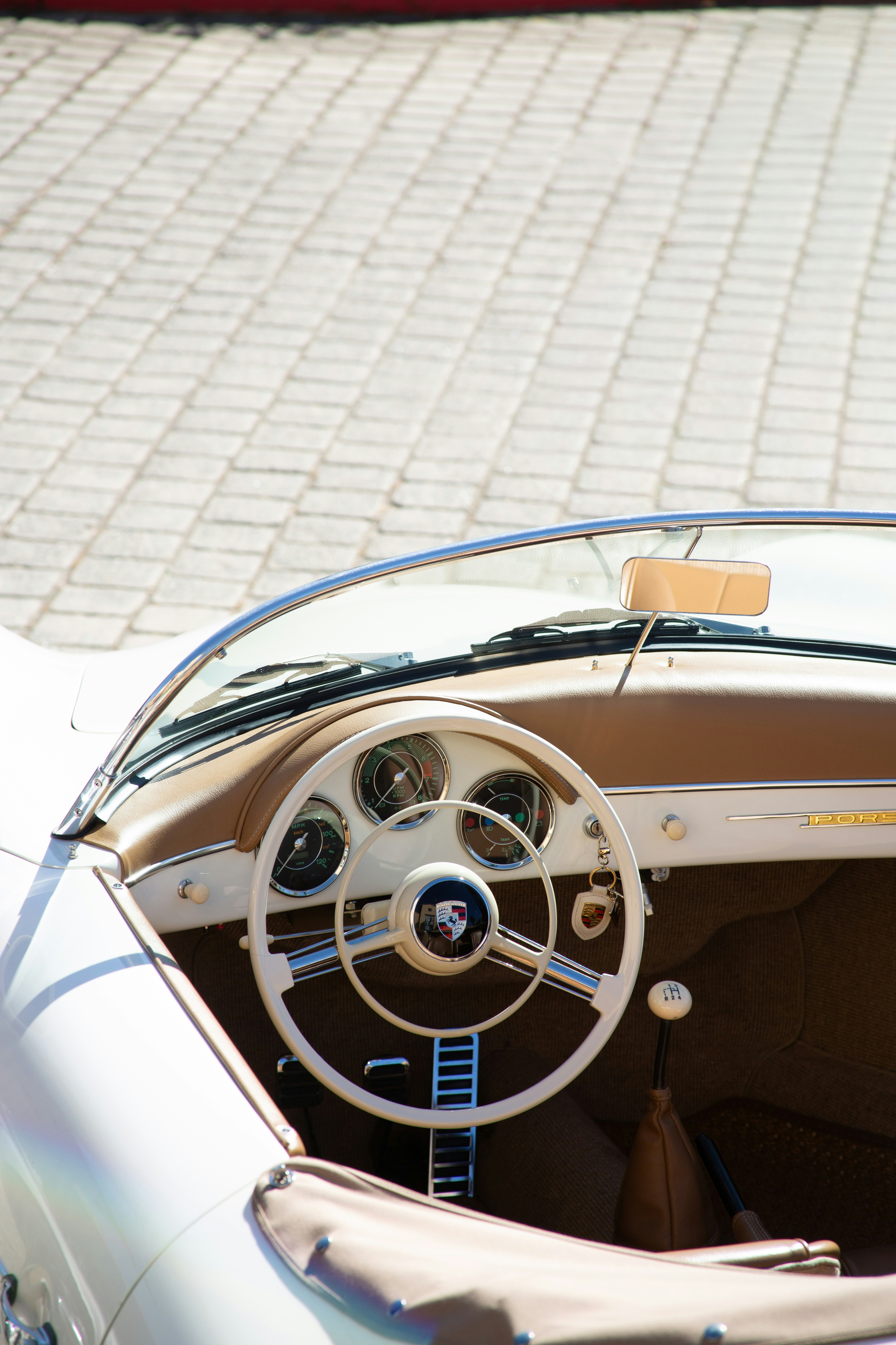 Vintage Porsche Interior: Cream Leather, Chrome Dash, and Steering Elegance