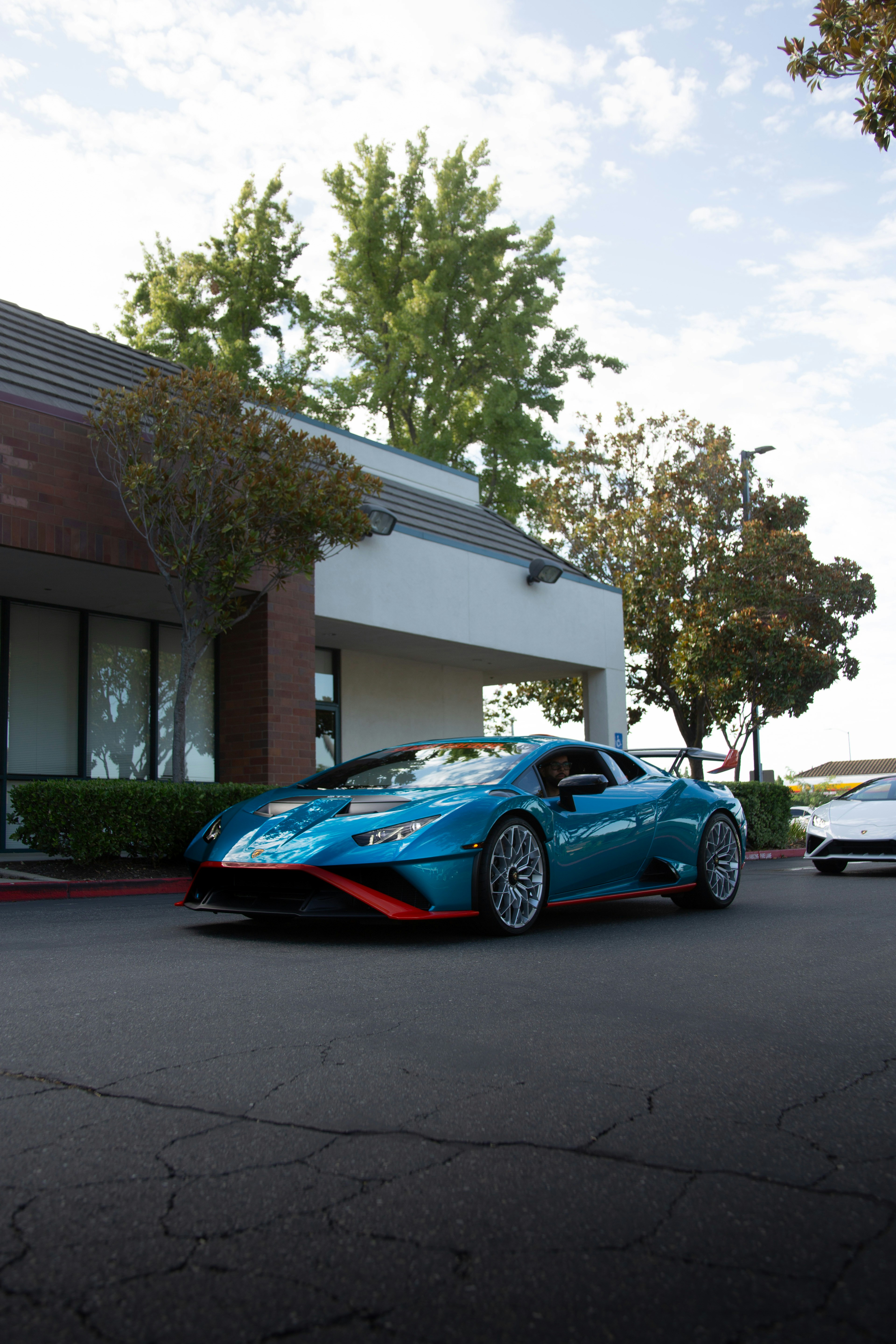 Blue Hypercar, Red Accents, Quiet Morning Parking Lot