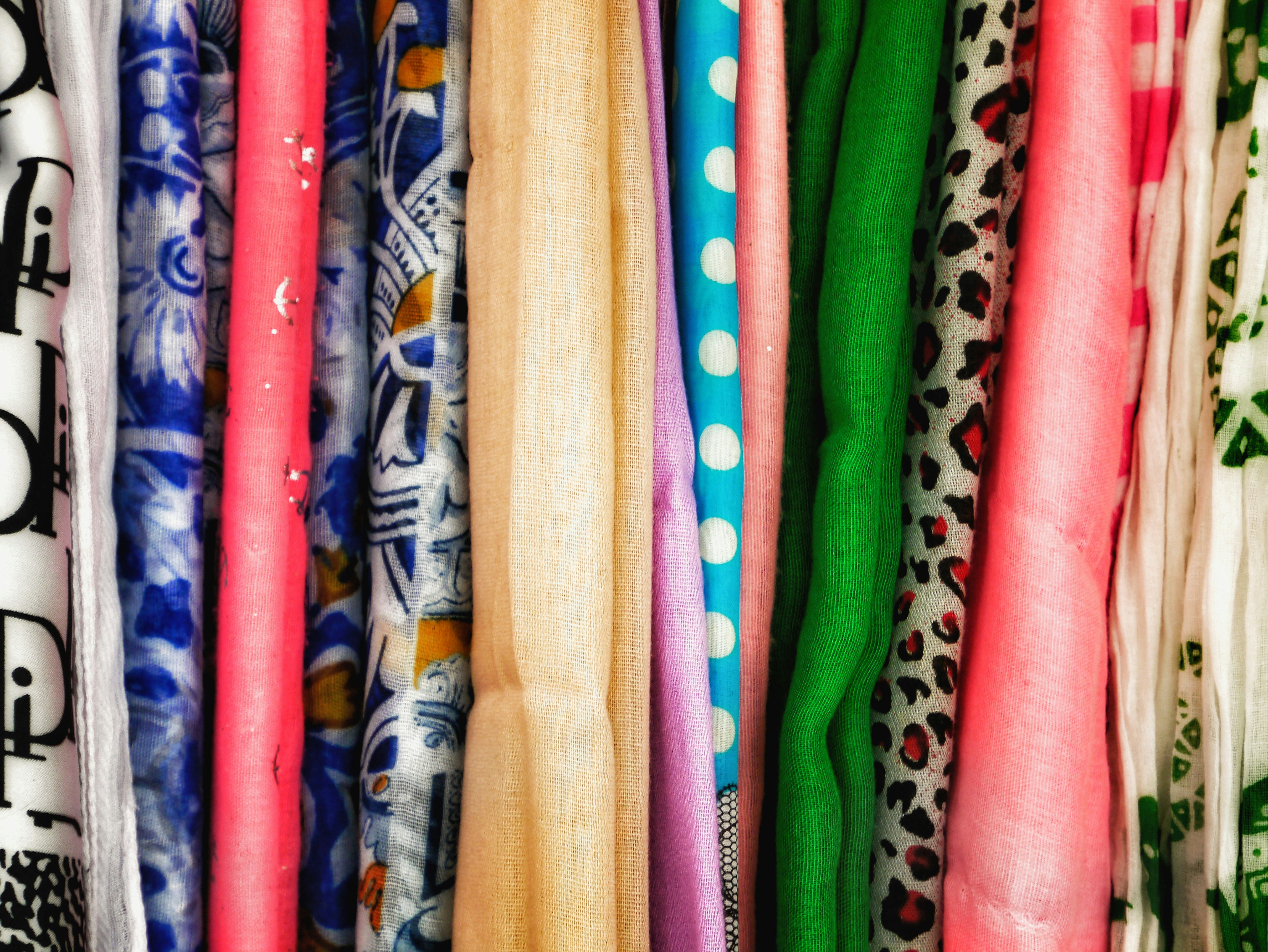 Colorful Fabric Aisle: A Close Look Through a Rainbow of Textiles