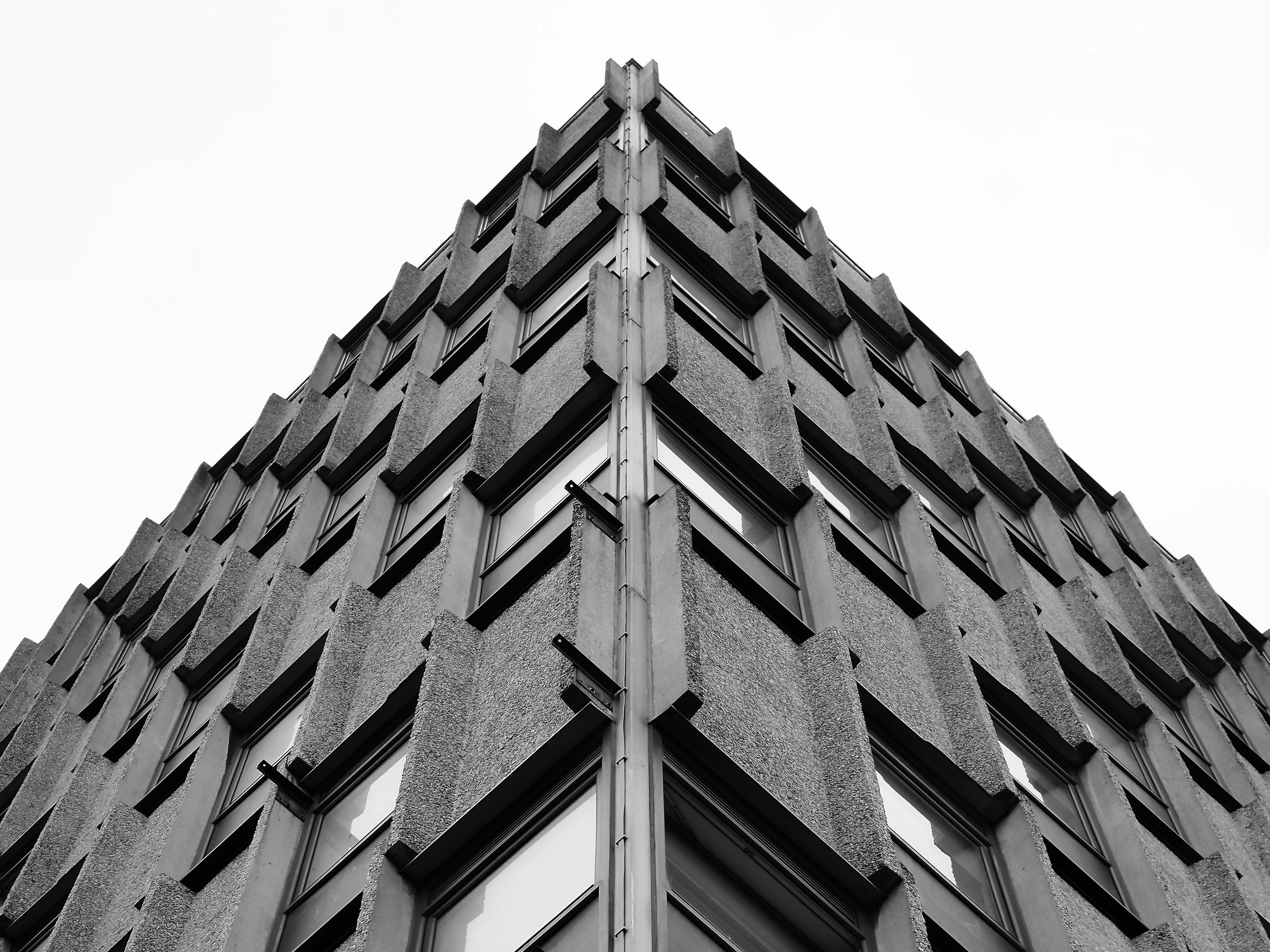 Concrete Zenith: A Vertiginous Facade Reaching Skyward