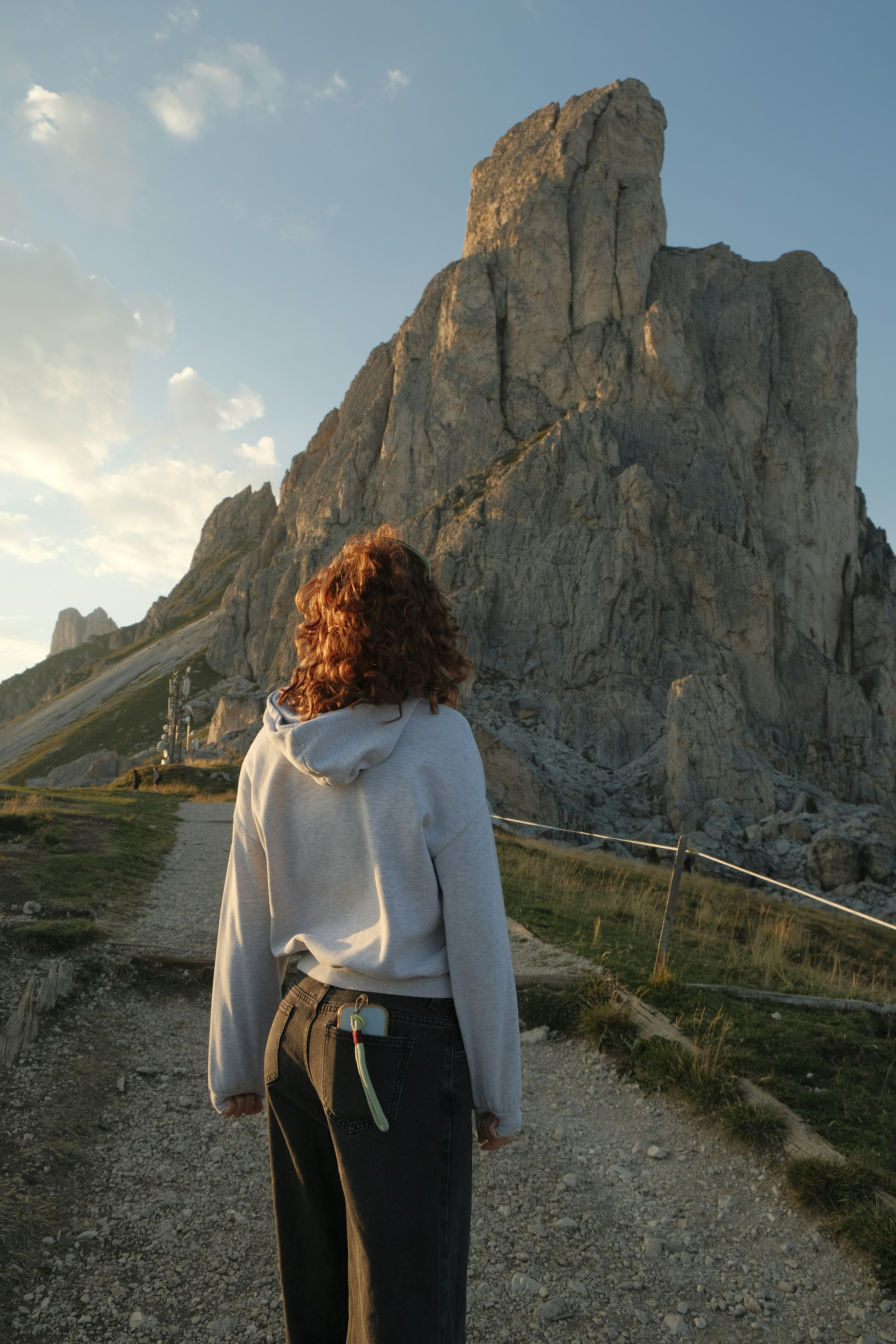 Footsteps toward a granite sentinel at golden hour