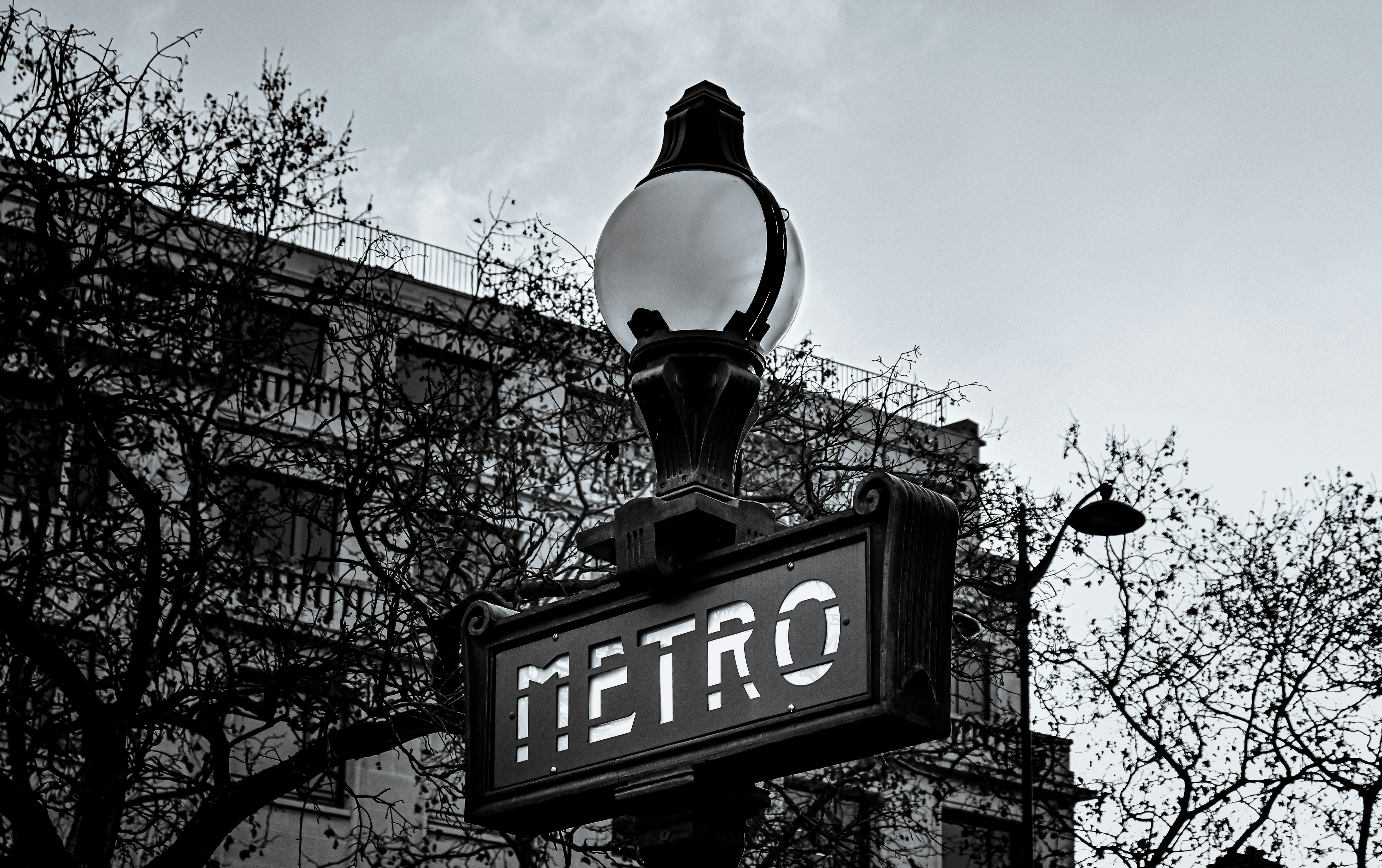 Metro Sign Portrait in Monochrome Twilight