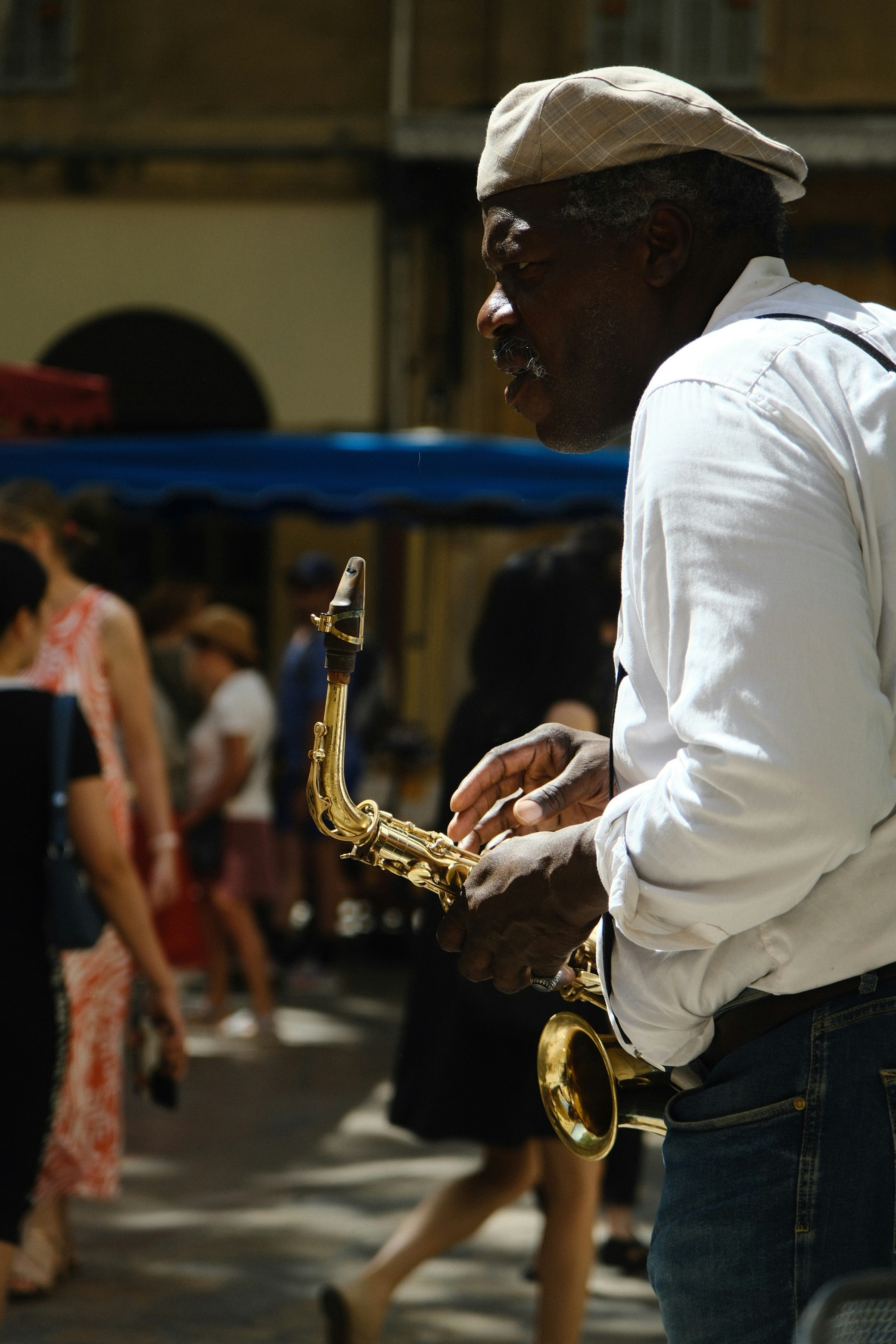 Saxophone in the Sun: A Street Musician's Contemplative Moment