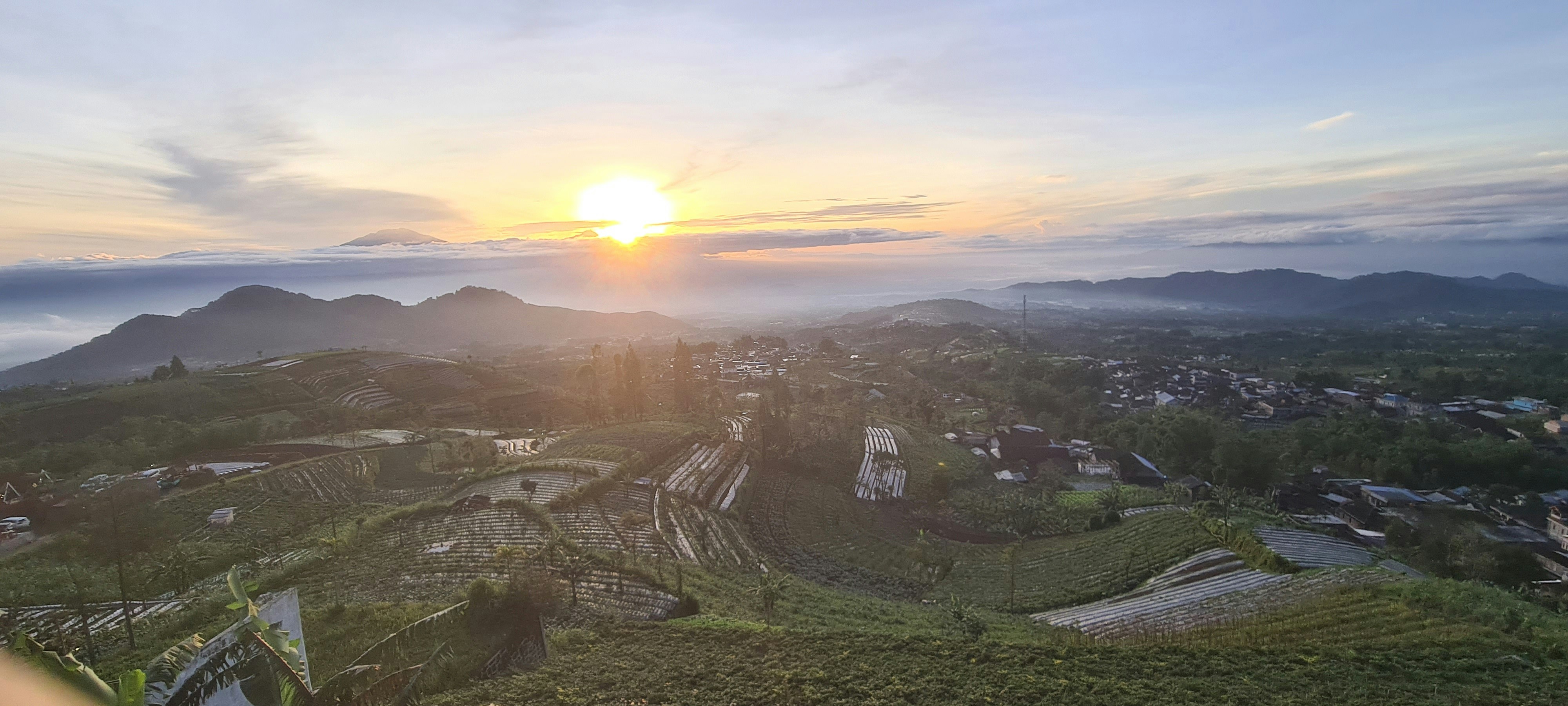 Sunrise Over Terrace Farms and Coastal Hills