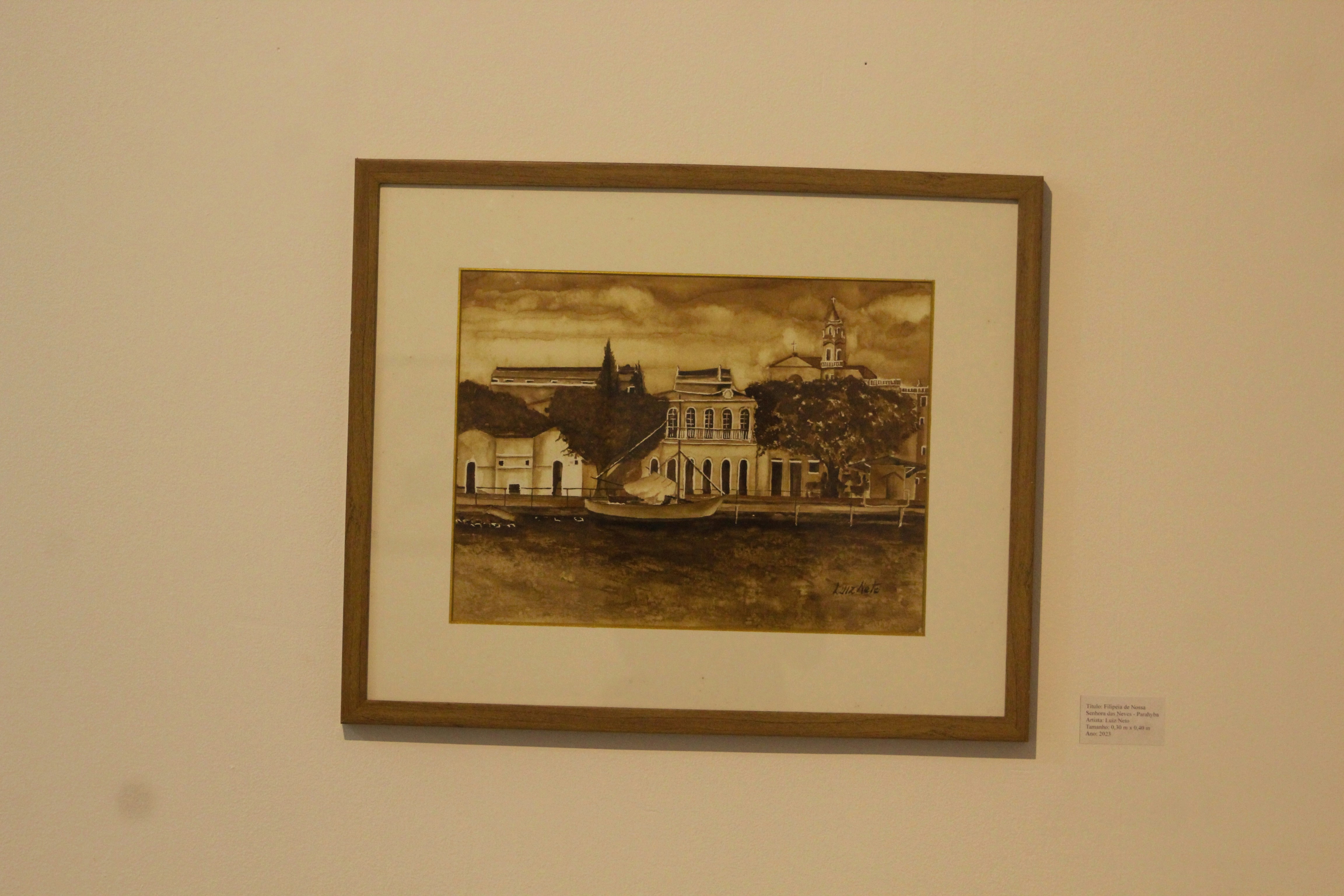 Framed Sepia Cityscape: A Quiet Gallery Moment