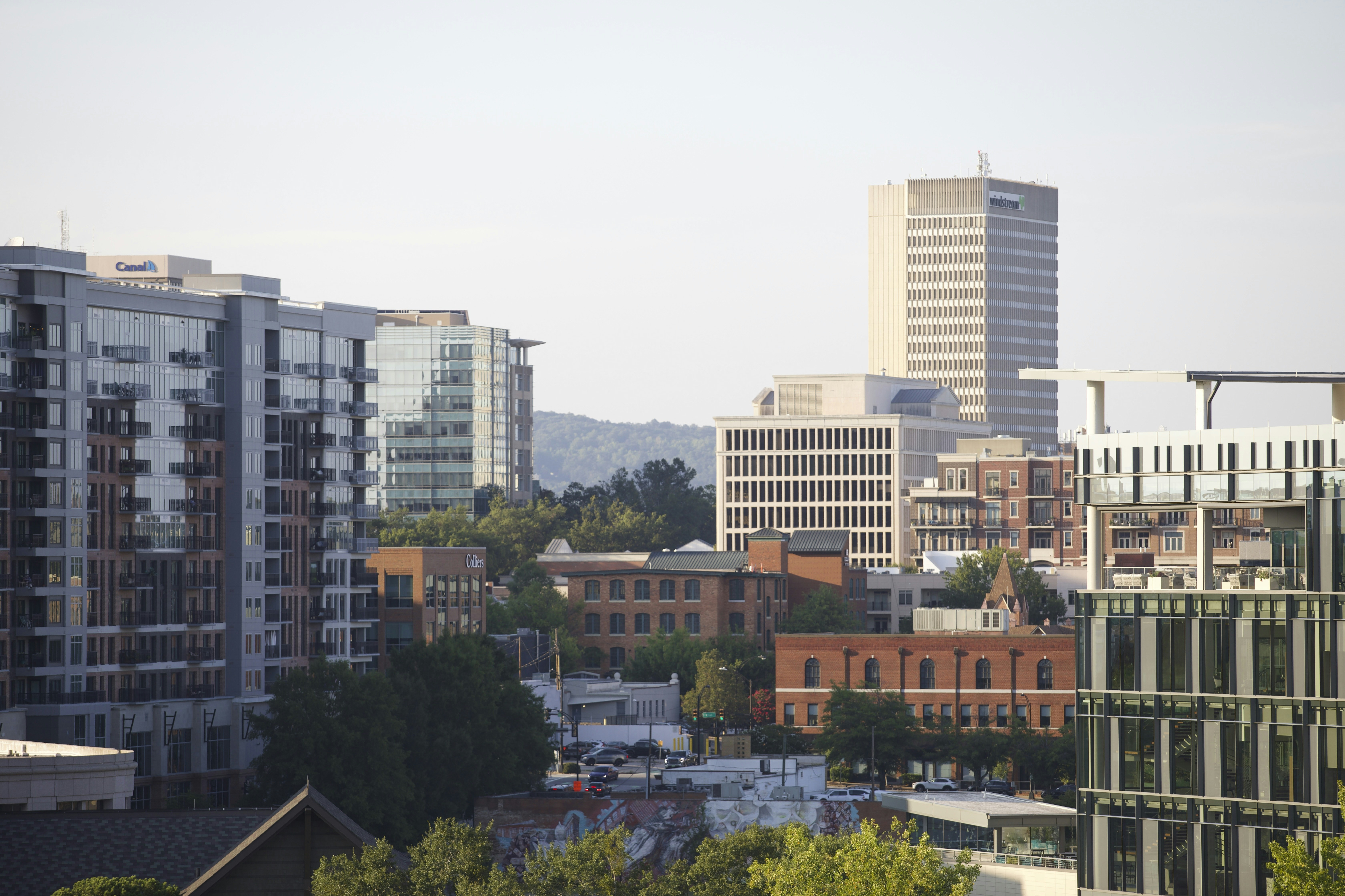 Sunlit Cityscape Above the Rooftops
