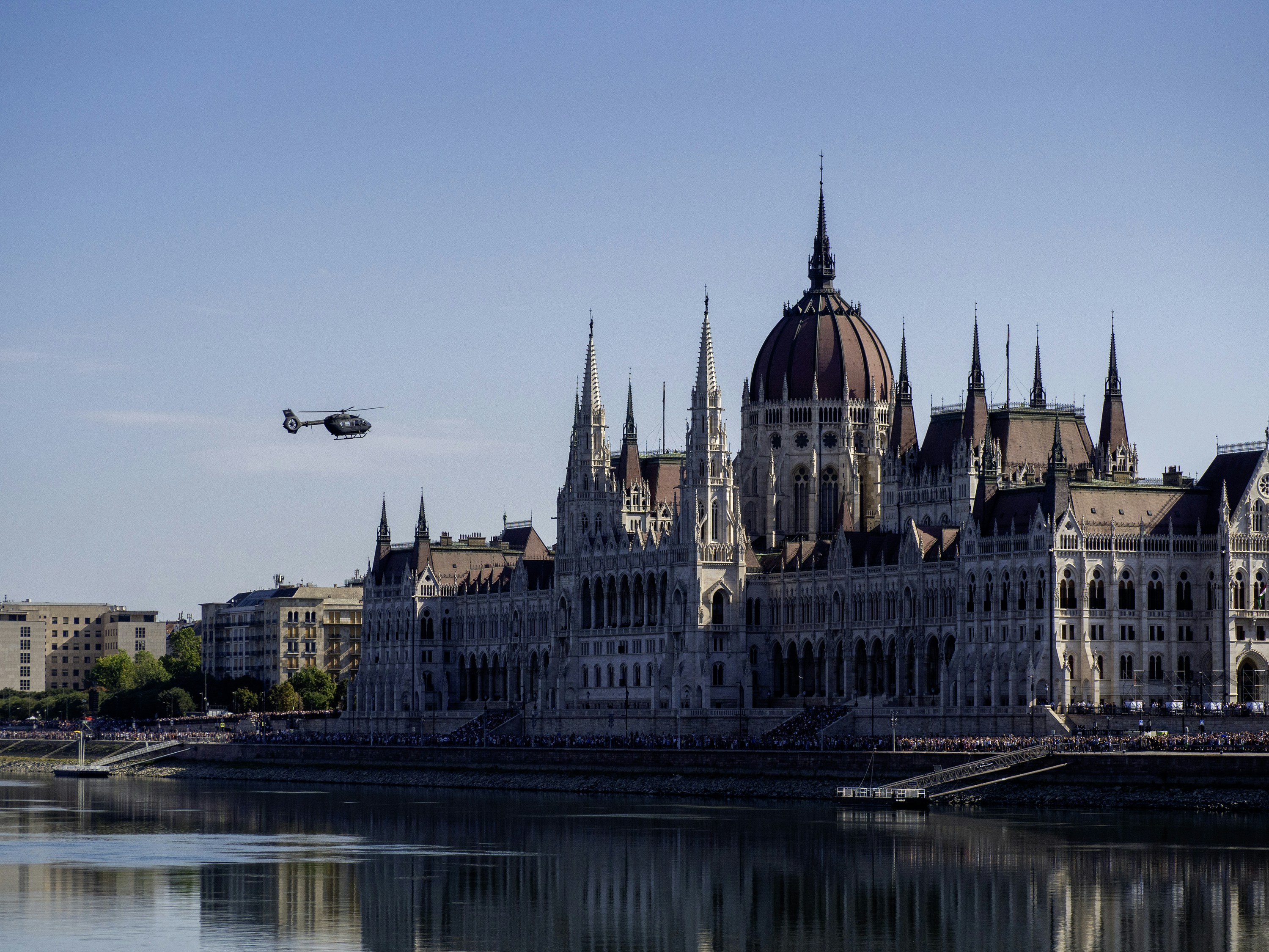 Majestic Danube Front: Parliament Spires and a Distant Helicopter