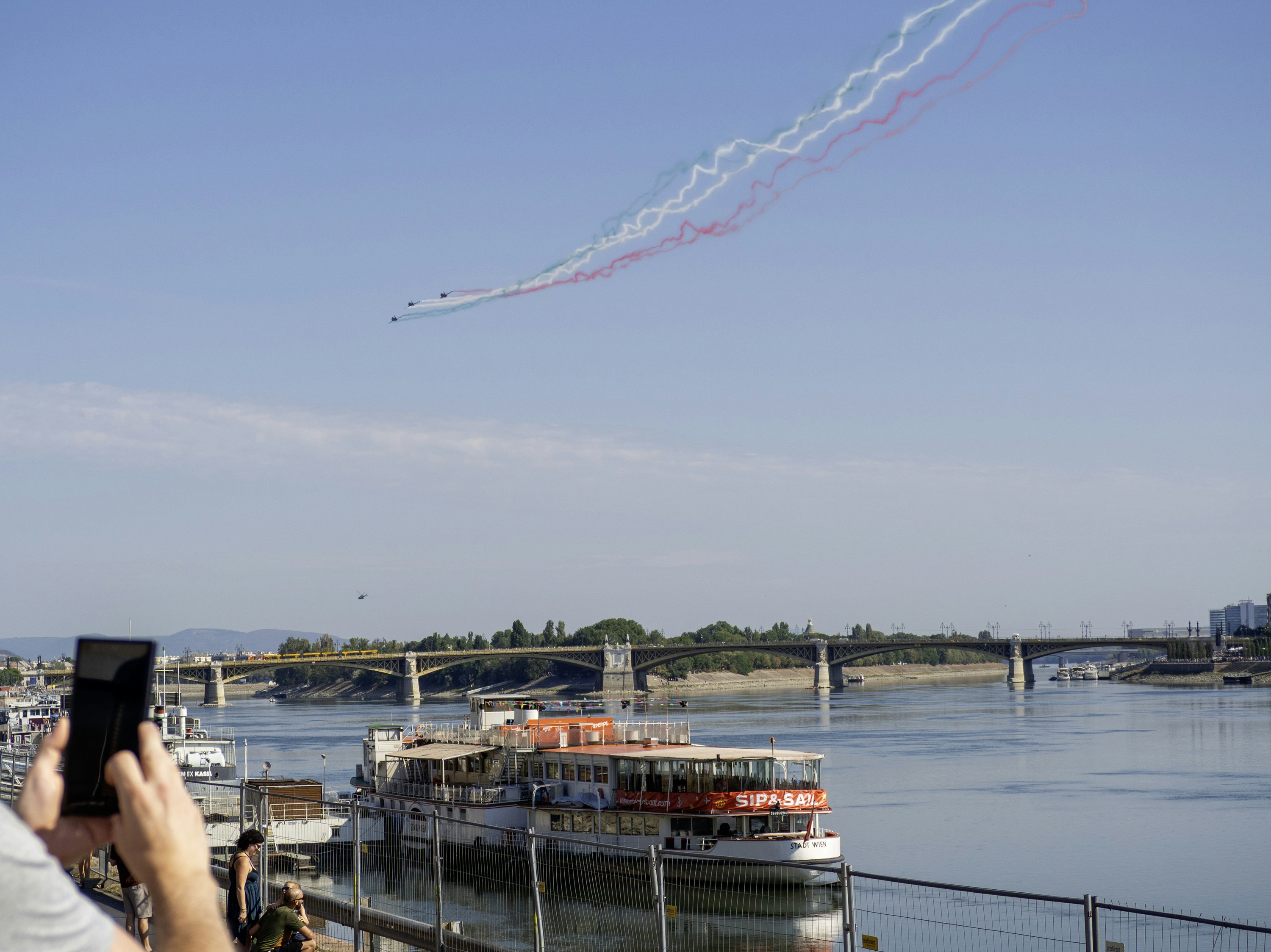 Airshow Over the River: Color Trails and Waterfront Life