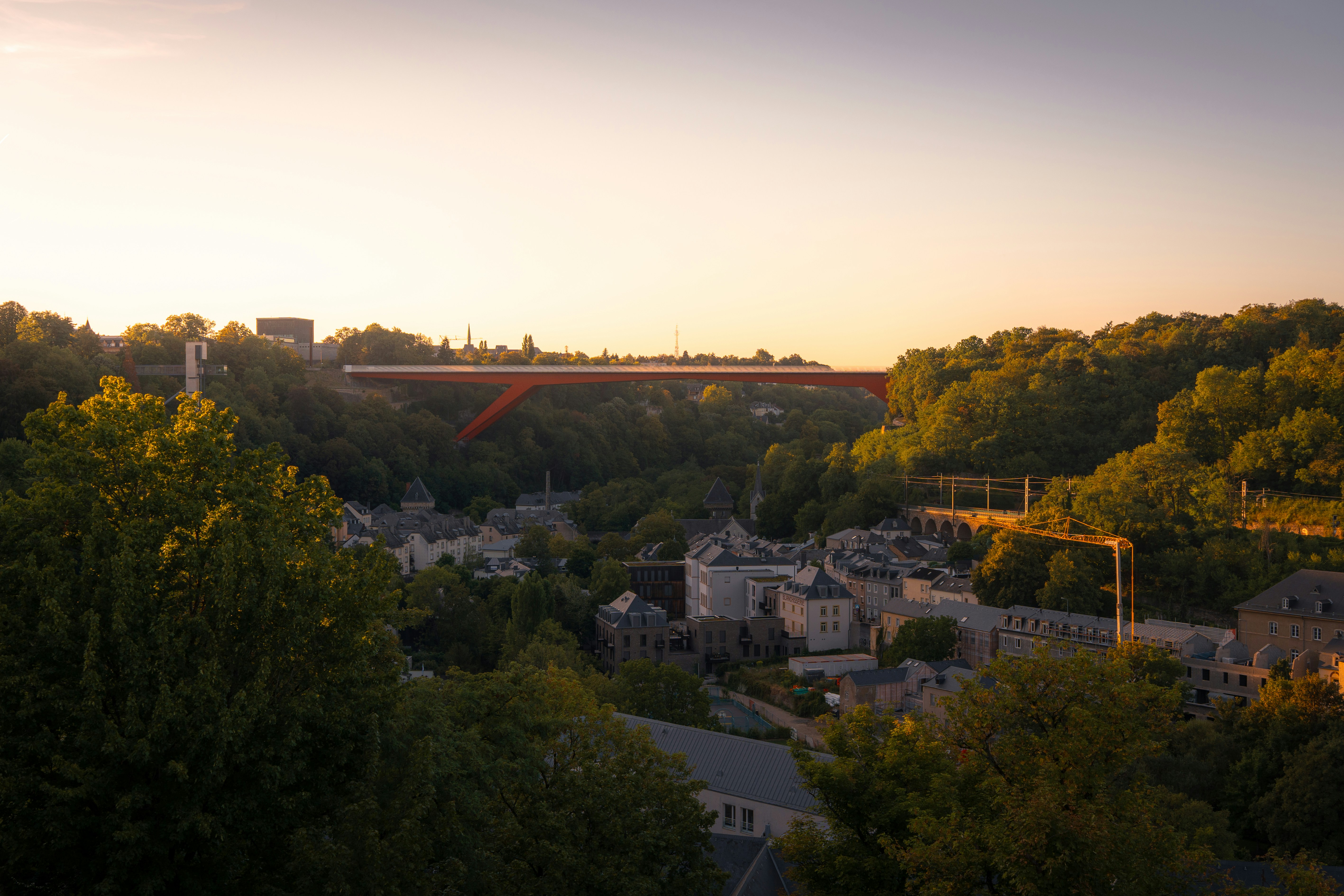 Twilight Over the Hills: A Suburban Echo Beneath a Golden Arch