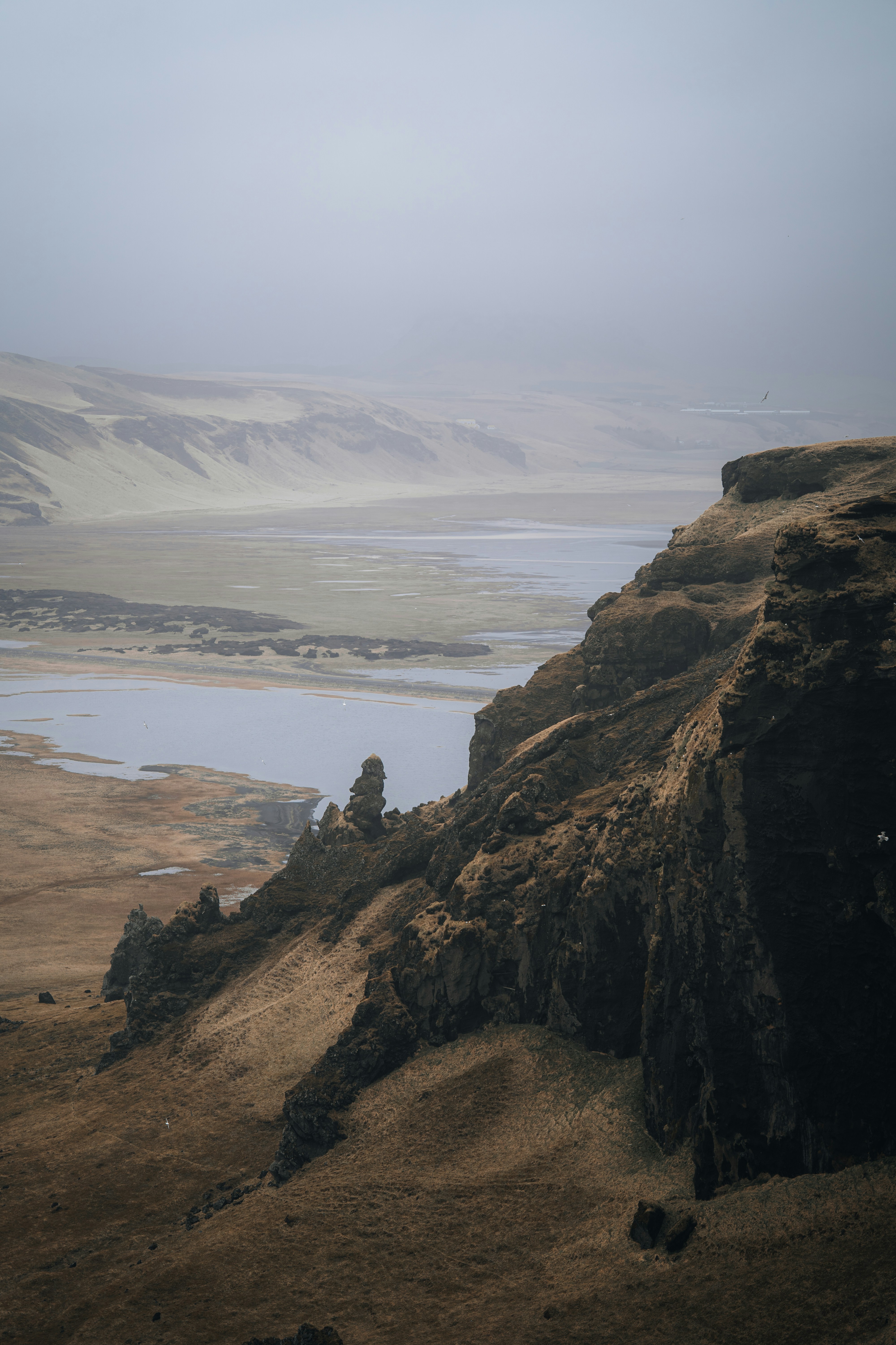 Edge of Silence: Tidal Flats and Cliffs