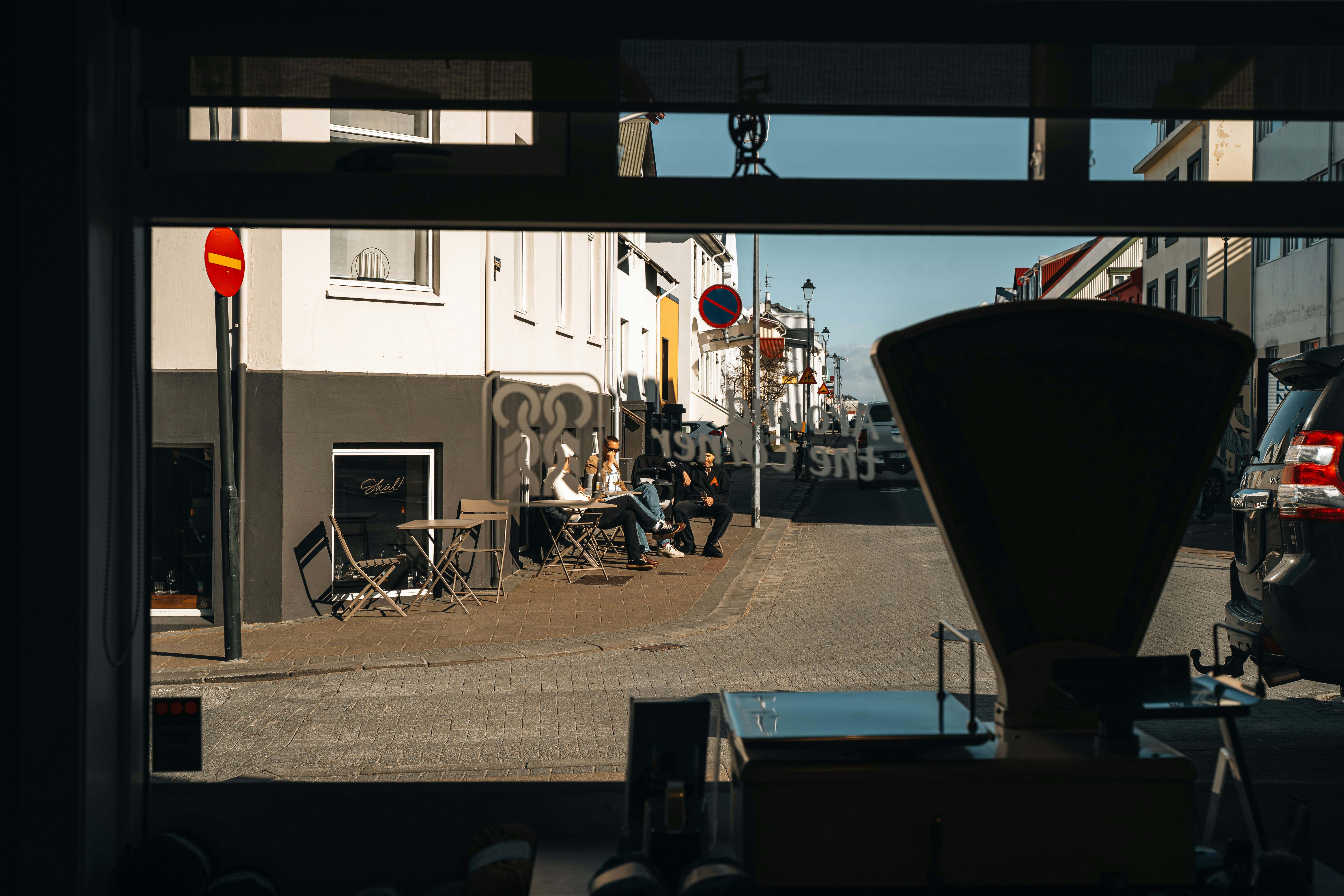 Café Street Quiet: A View Through a Shop Window
