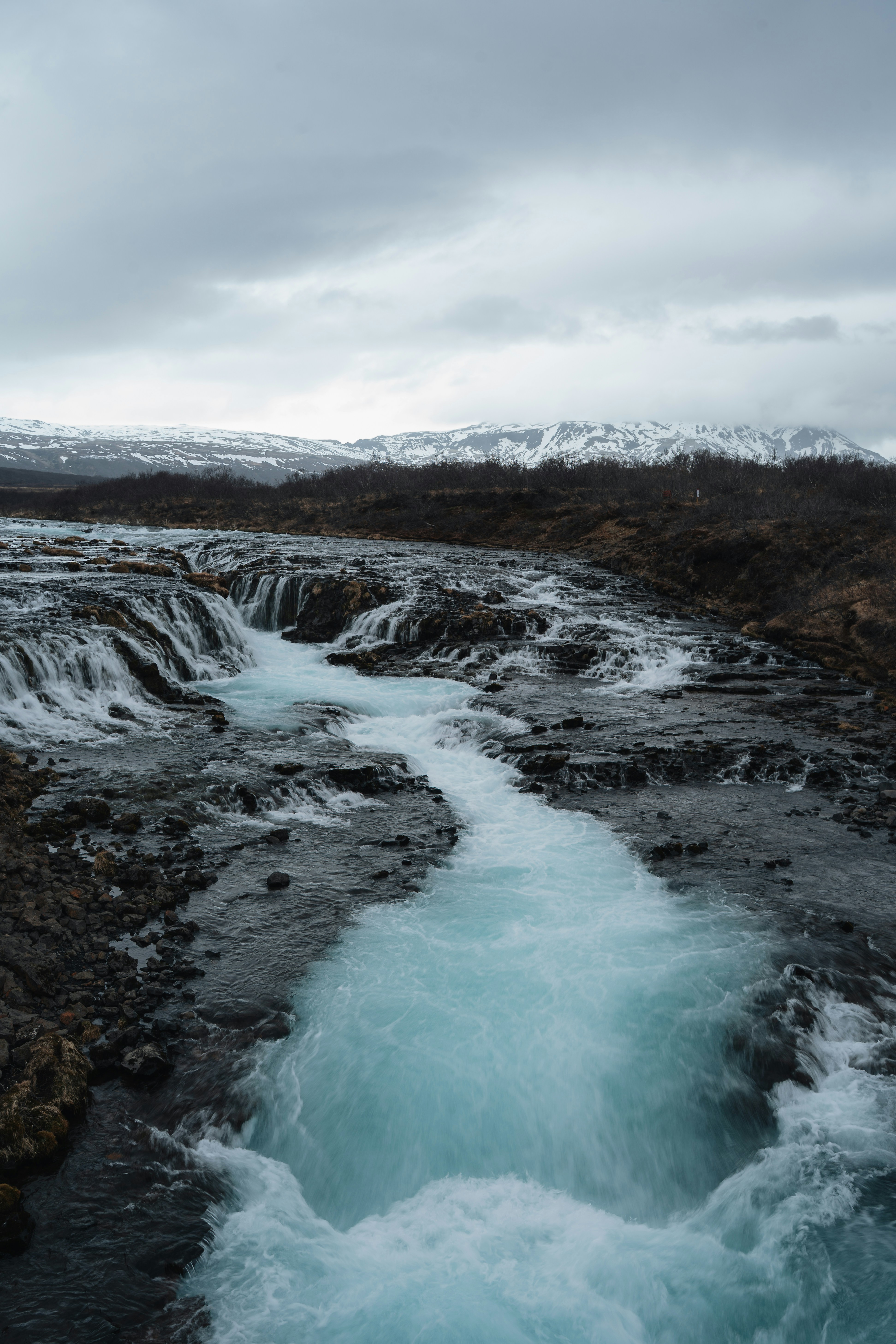 Glacial River Gorge: A Turquoise Vein Through Volcanic Rock