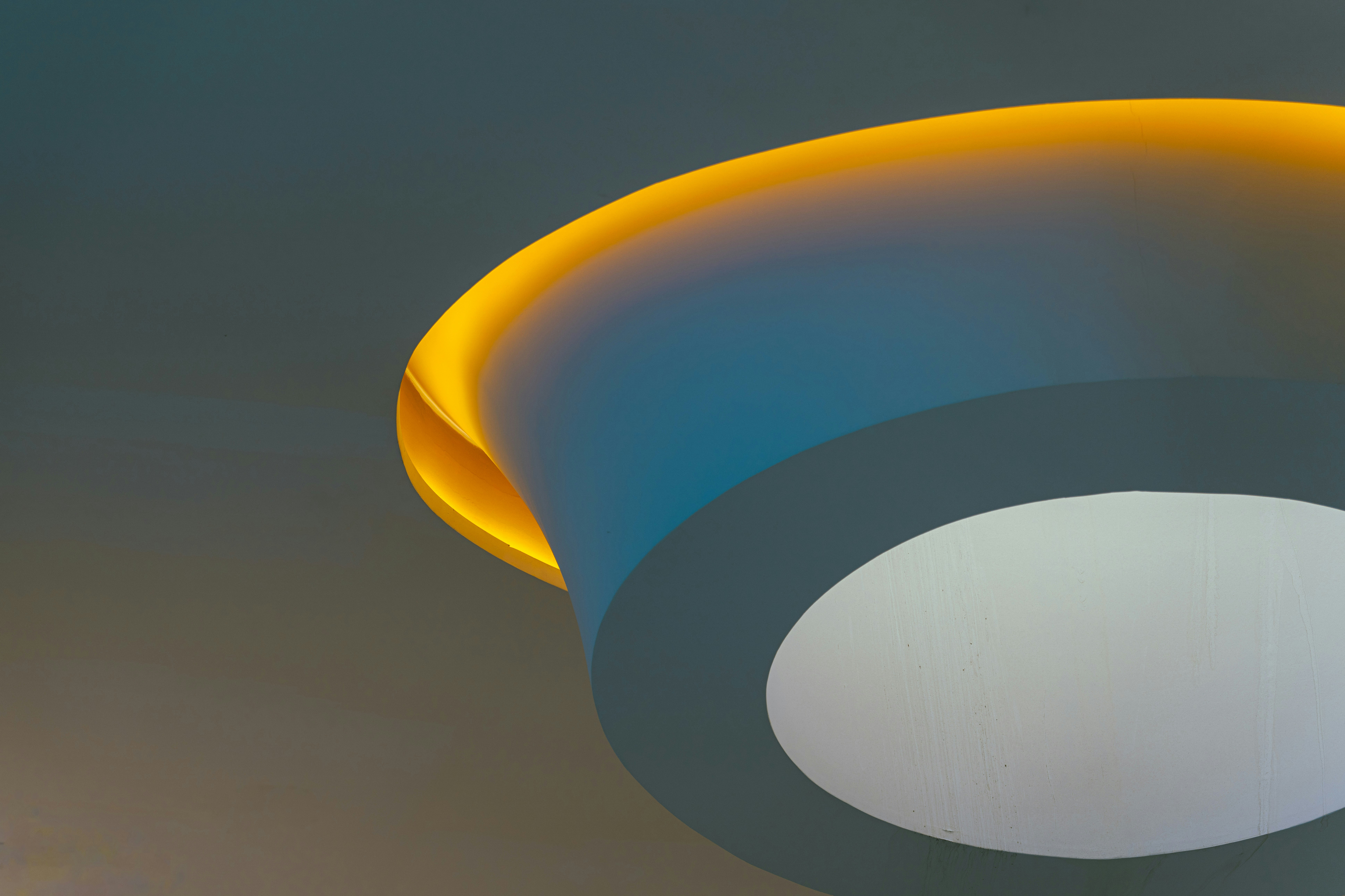 Circular Spotlight: A Weathered Ring Illuminates the Sky