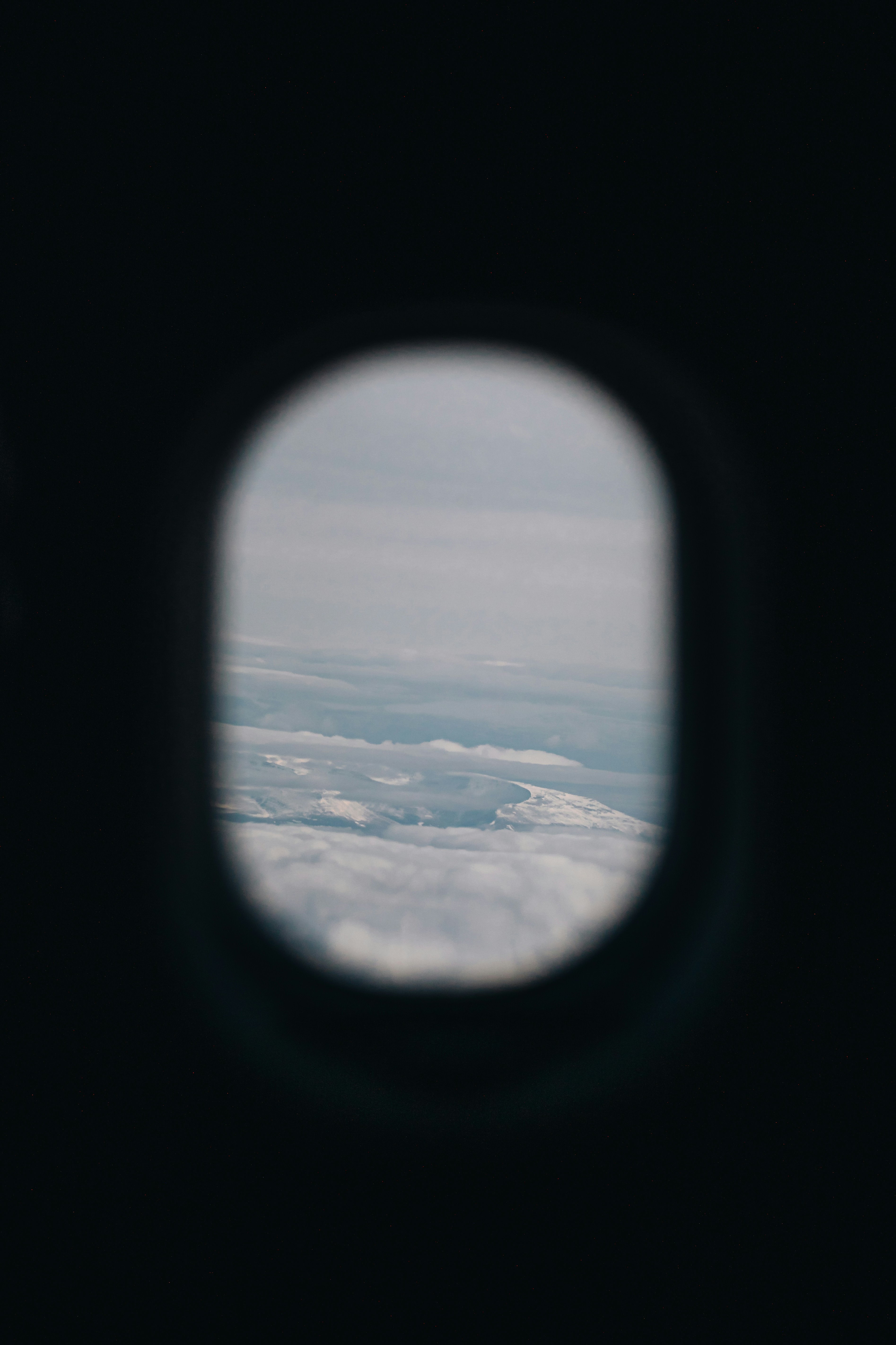 Window to the Sky: Aerial Clouds Through an Aircraft Porthole