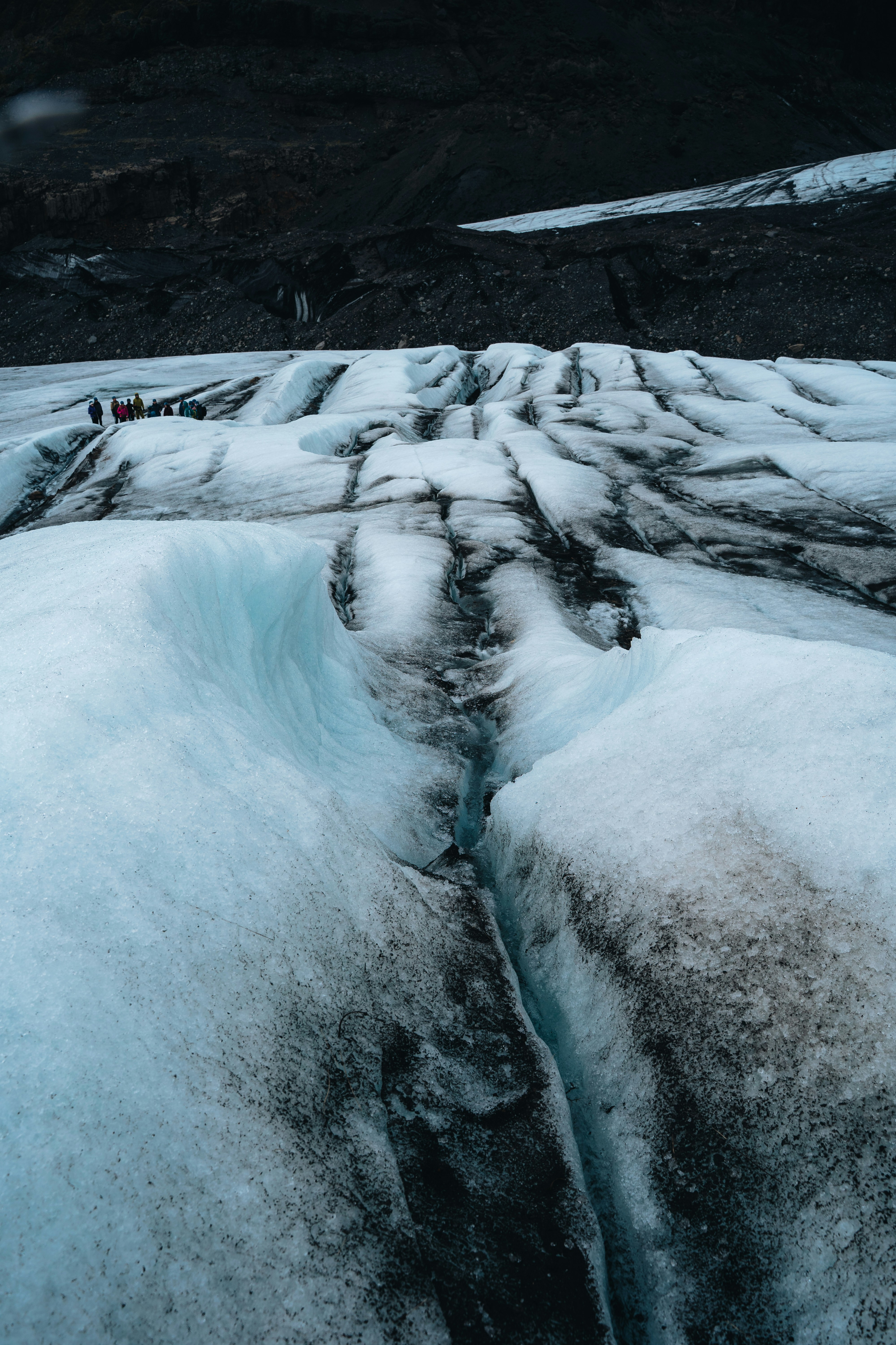 Glacial Rivulets: A Line of Silence Across Ice and Shadow