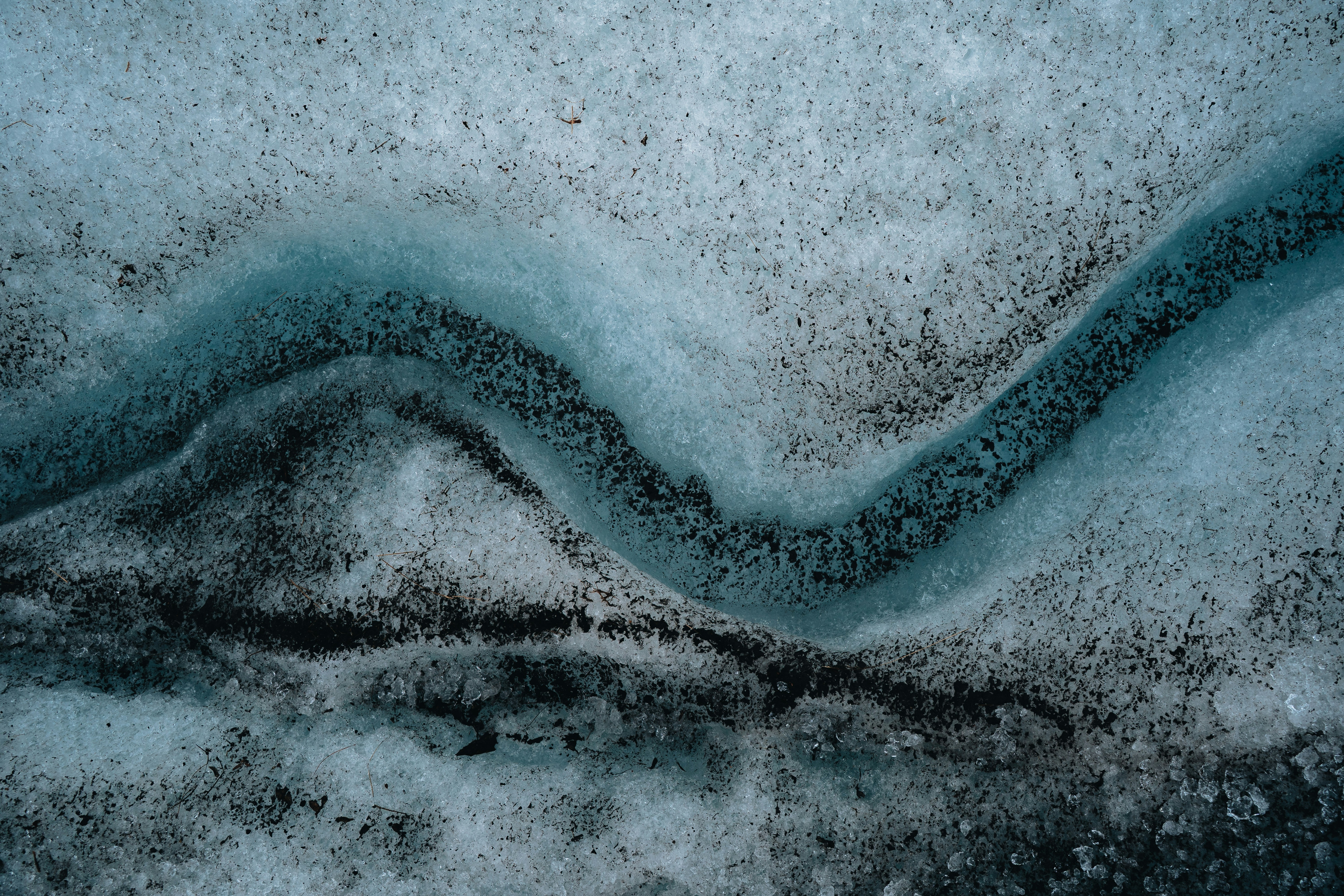 Curved Glacier Path: Afrayed Blue Lines in Frozen Silence