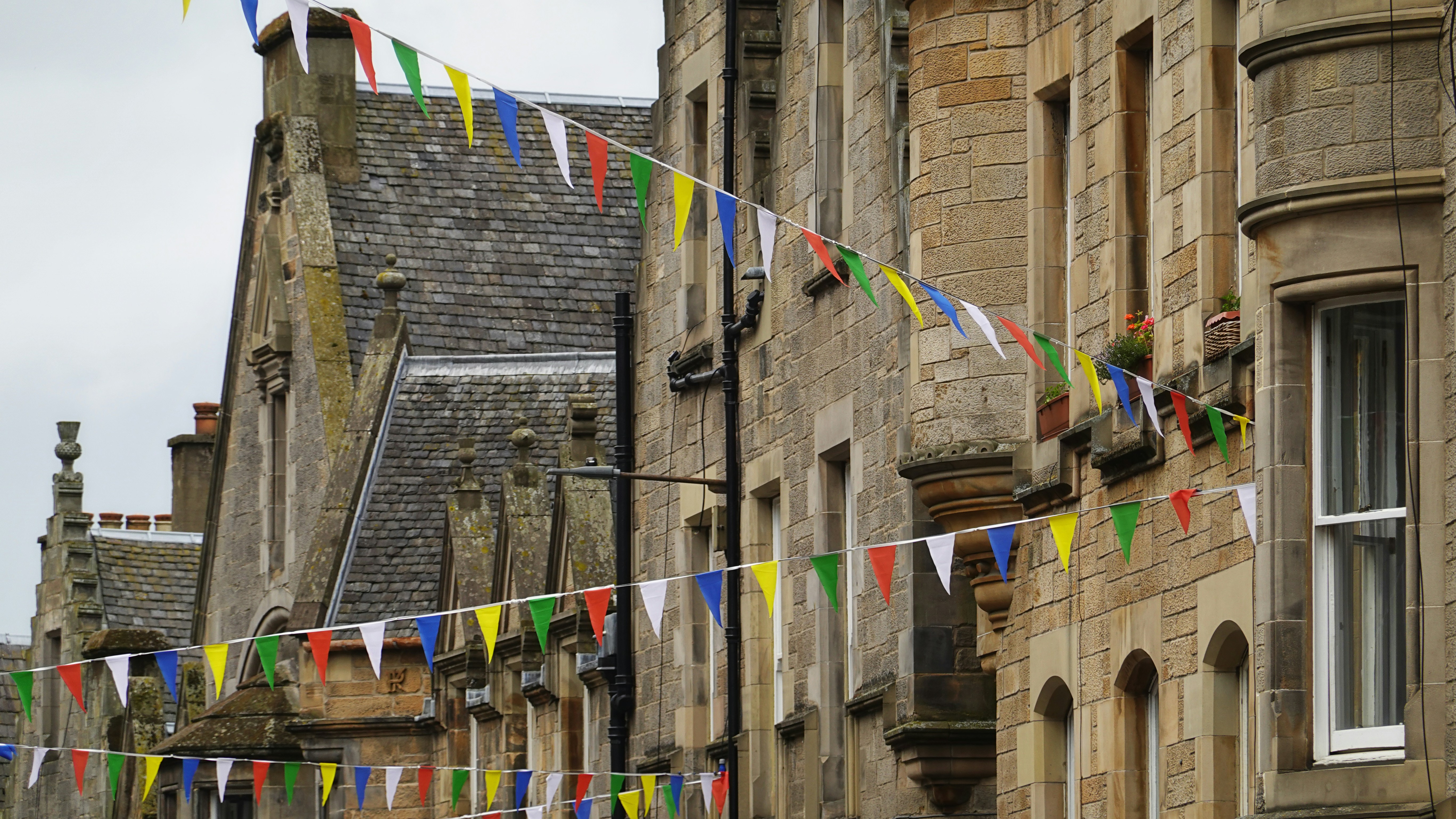 Festive bunting over a historic street