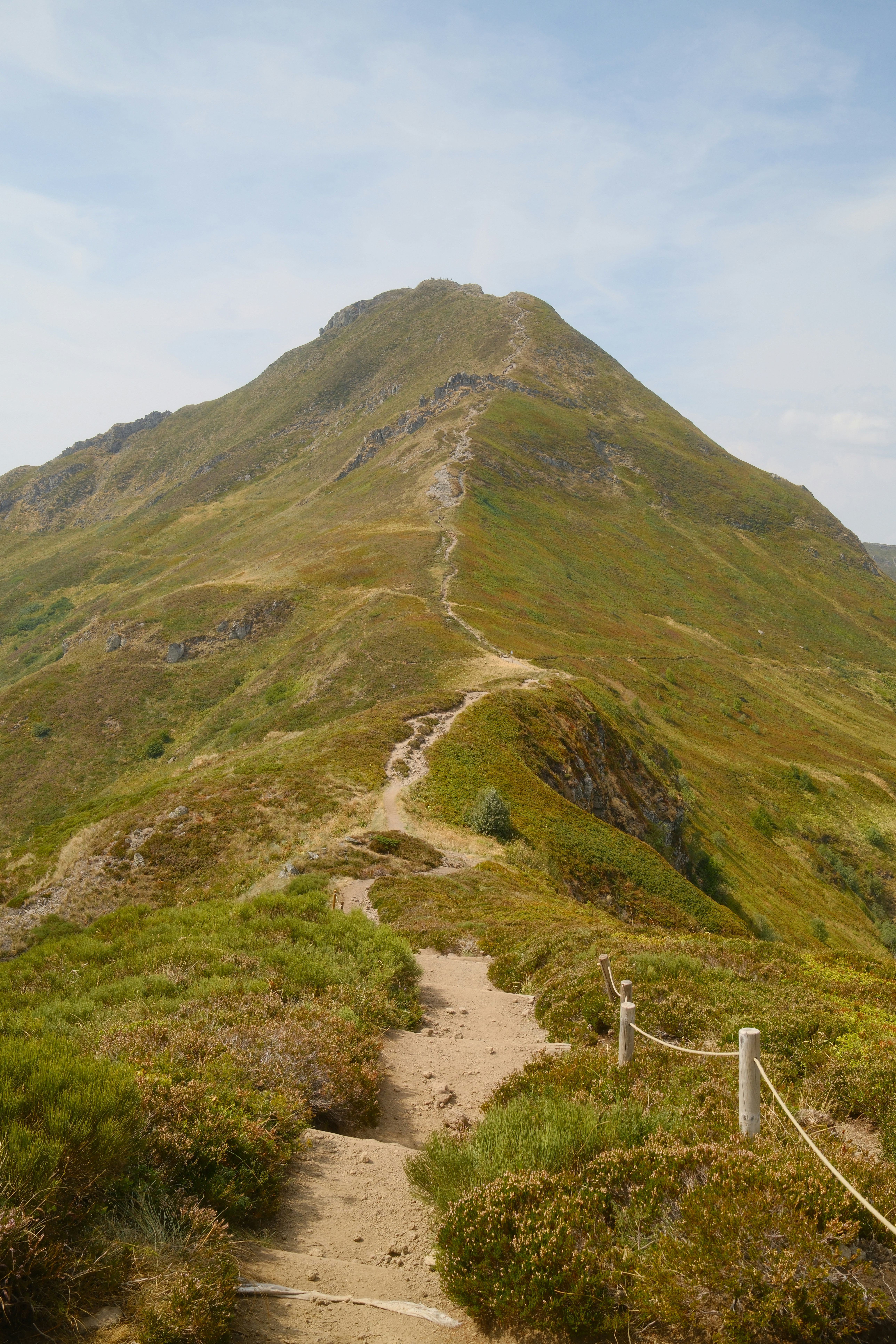 Trail to the Summit: A Winding Path Through Emerald Hills