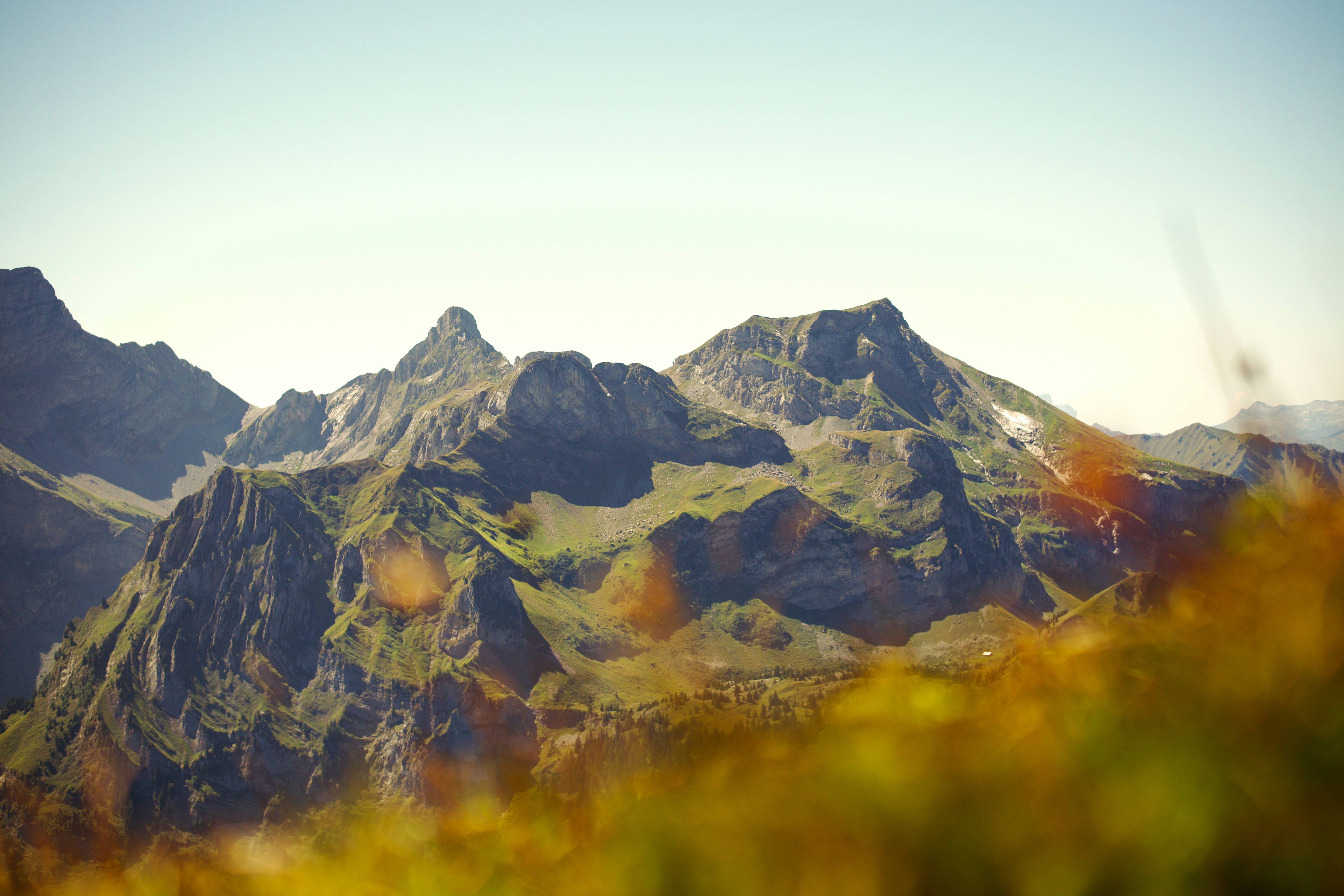 Jagged Horizon: Mountain Peaks Against Clear Skies