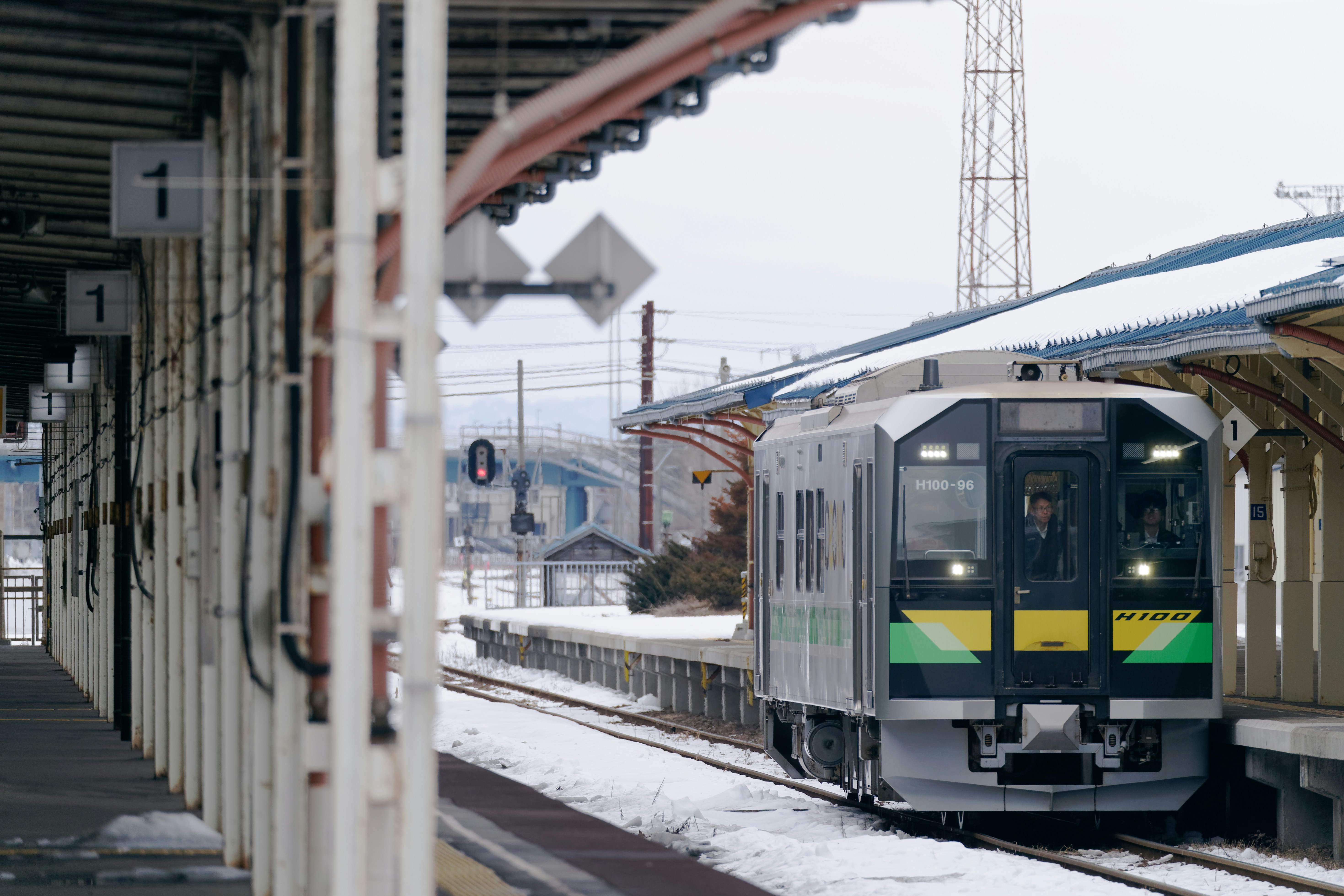 Locomotive at Dawn: A Quiet Ride Through Snowy Platform