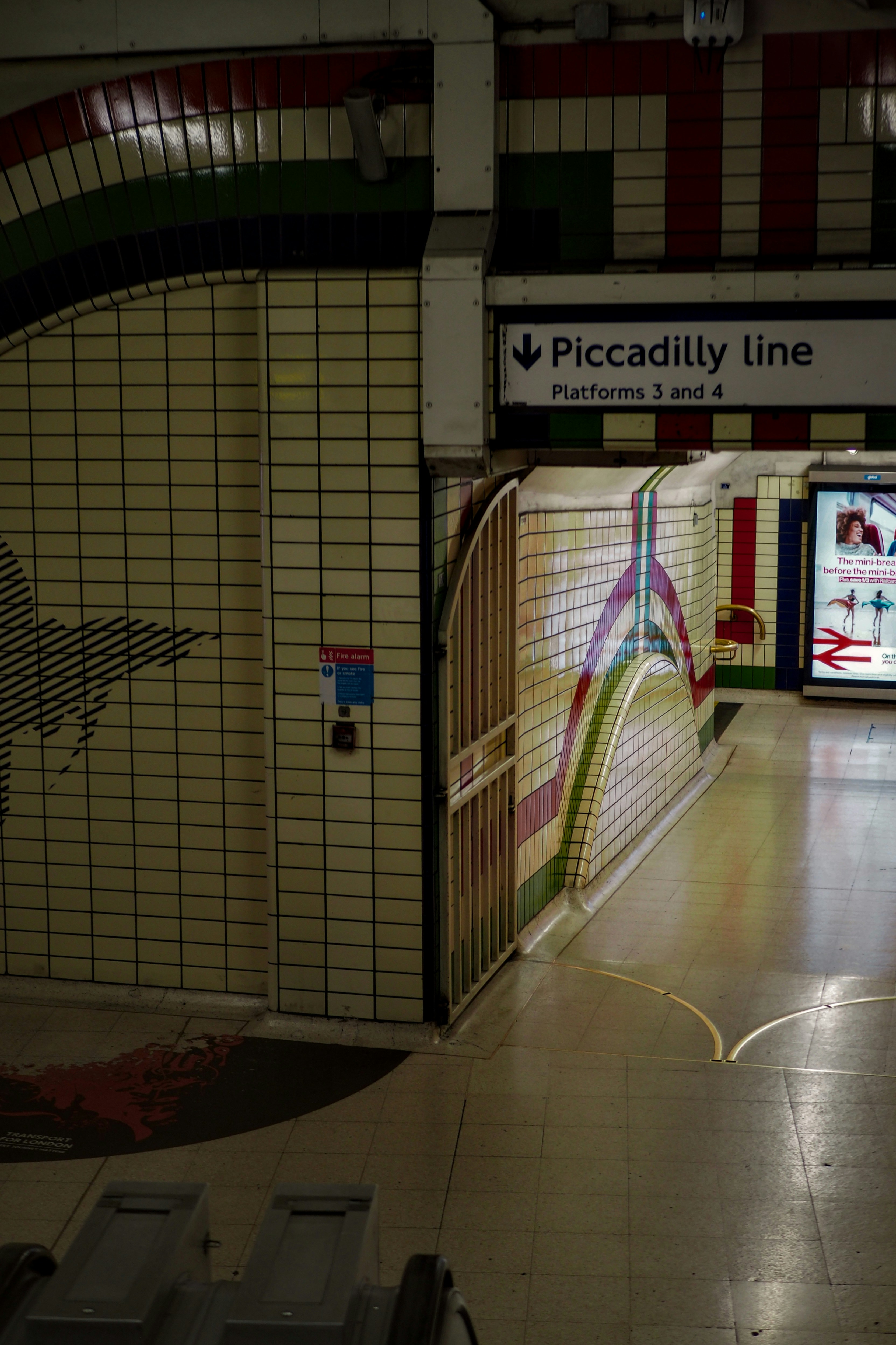 Underground Line Sign and Curving Mosaic
