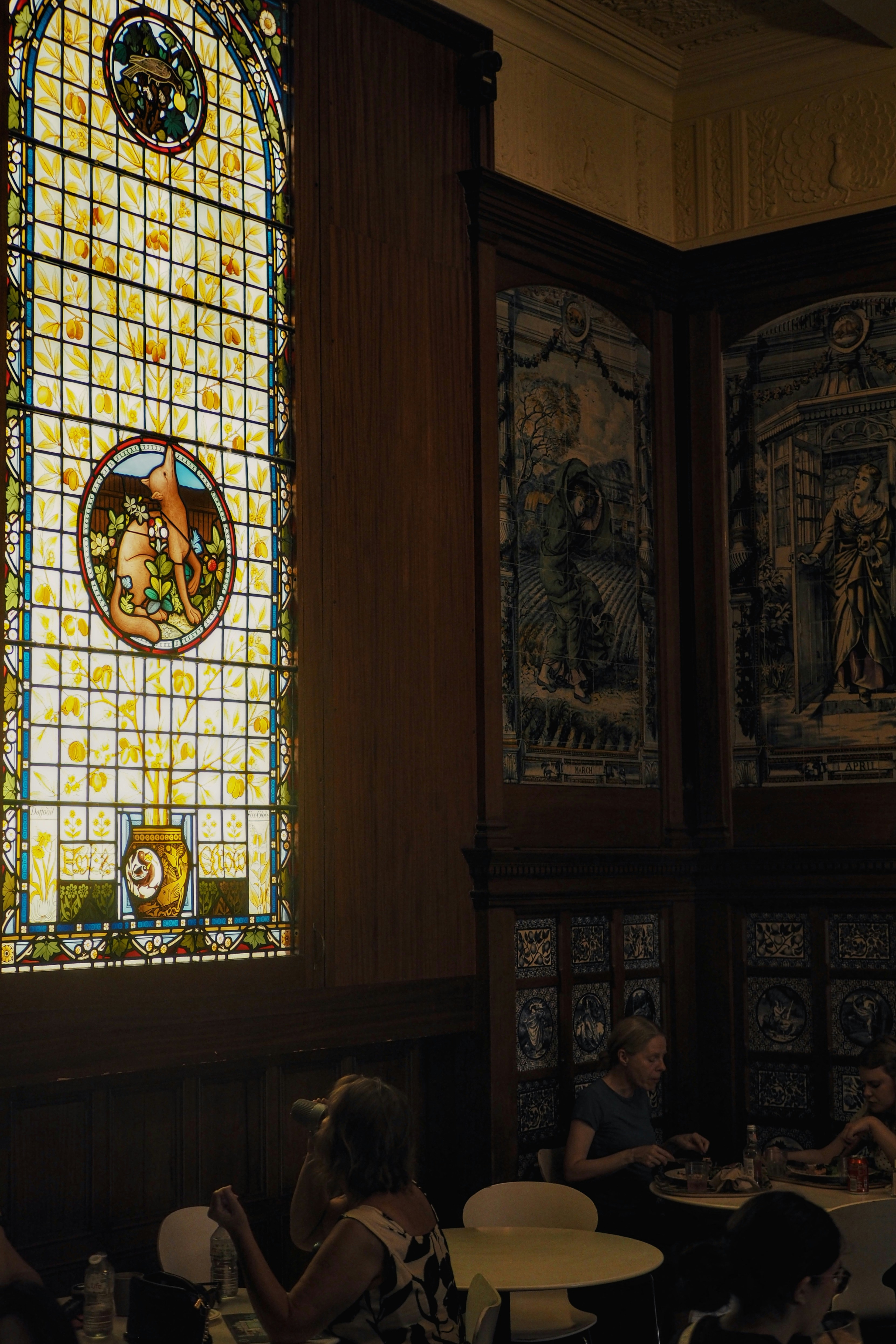 Stained Glass Light in a Dark Cafetería Hall