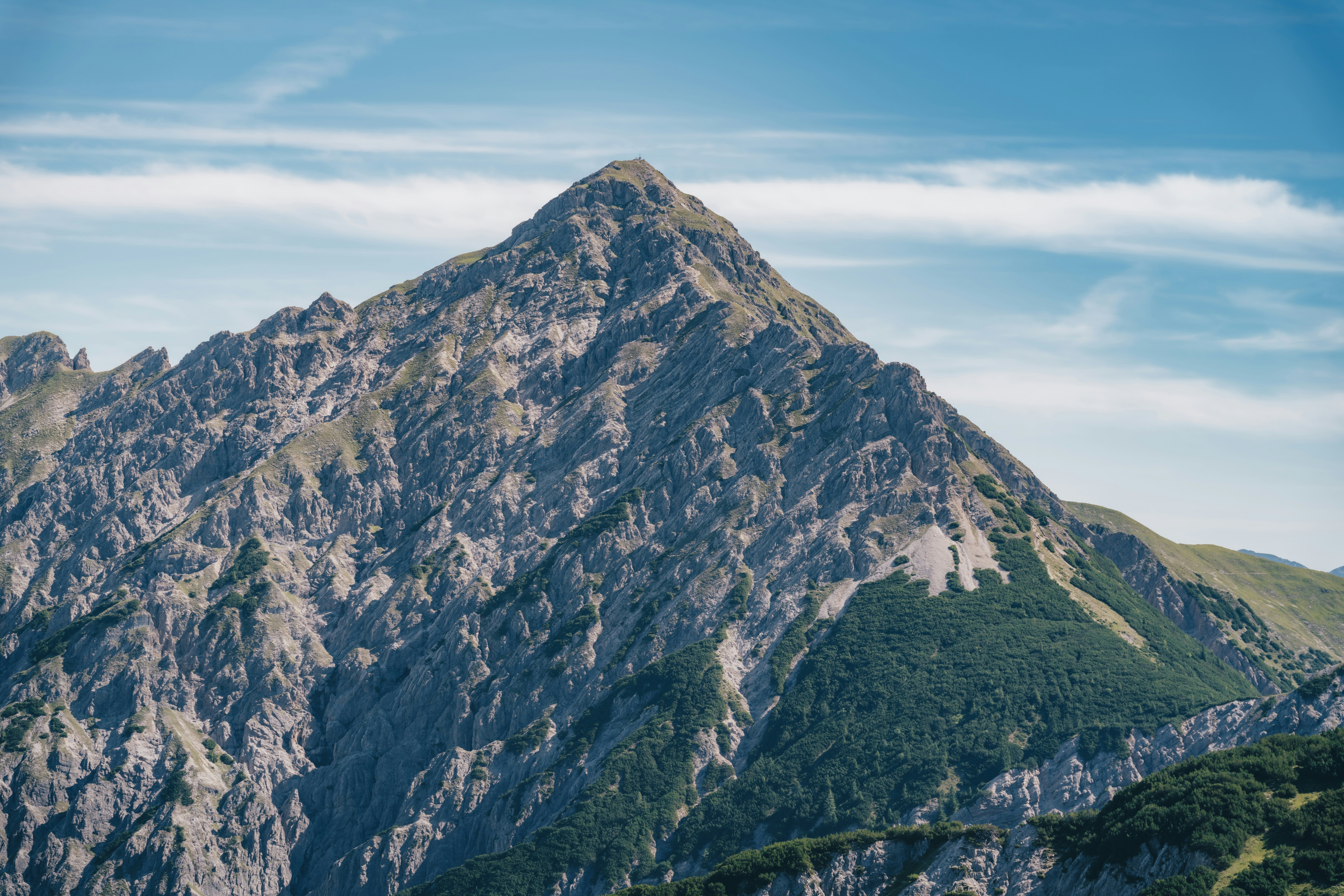 Summit Crest Under a Wide Sky