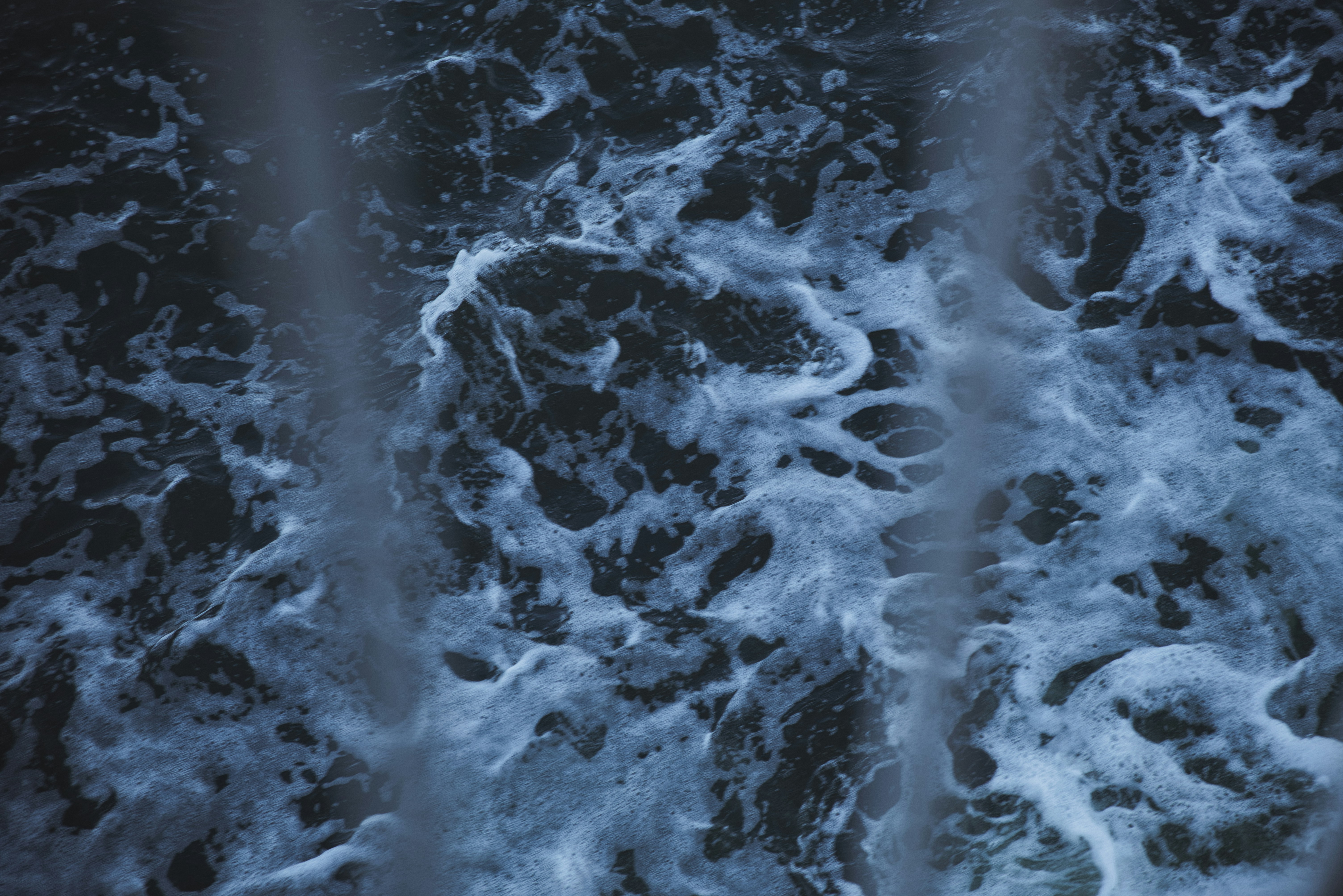 Turbulent Blue: A Close-Range Study of Ocean Foam in Motion