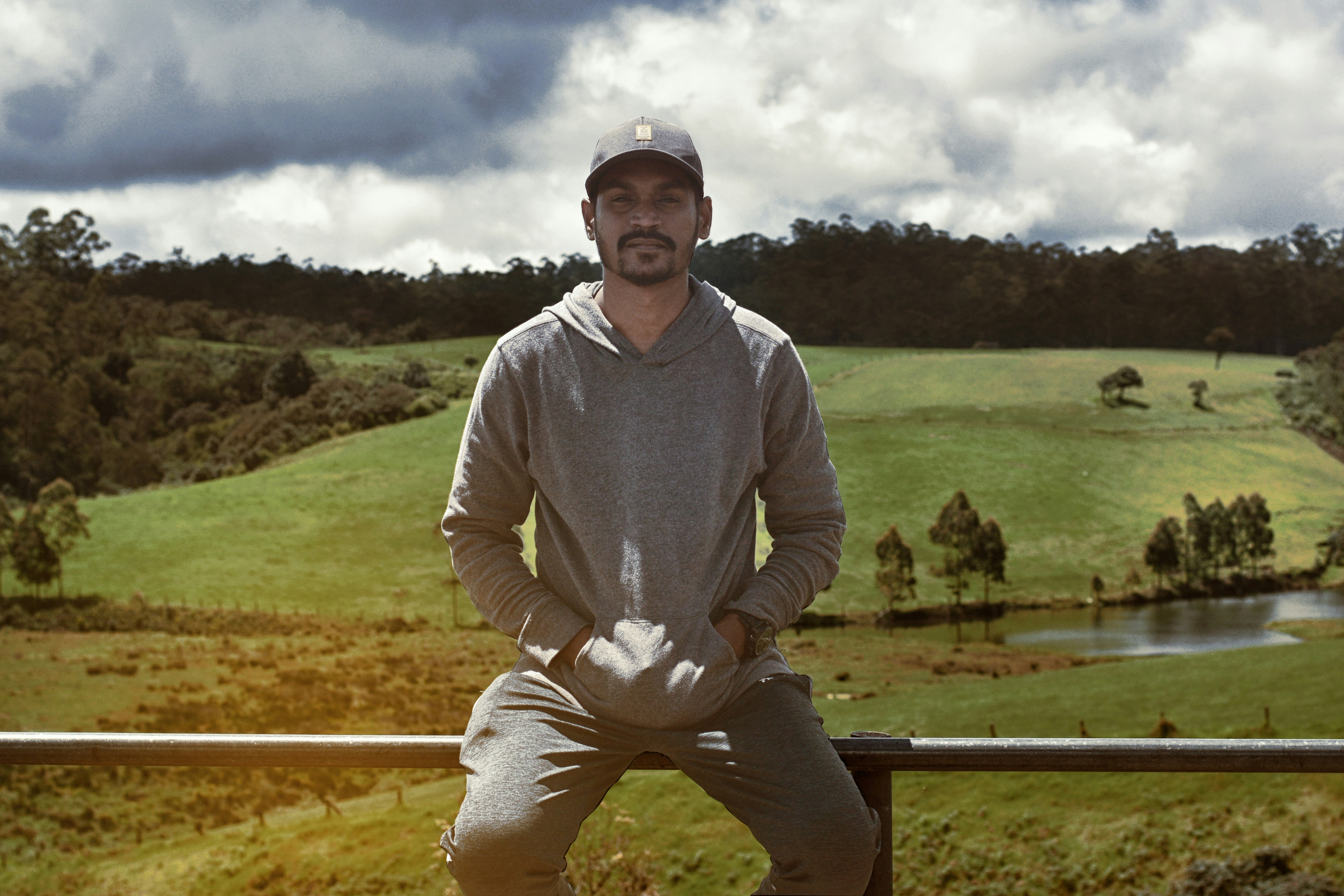 Seated in the Valley Light: Portrait in Open Fields