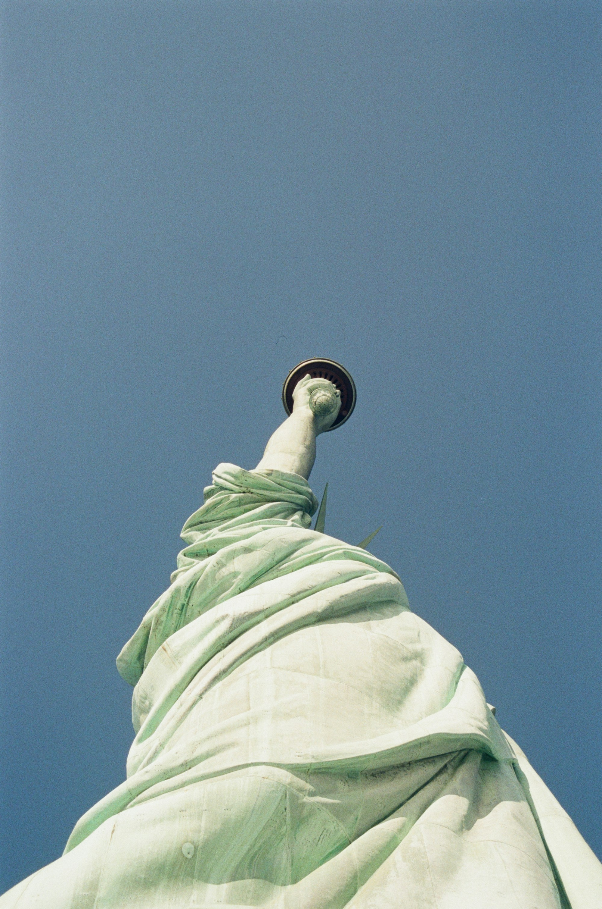 Rising Torch: The Statue of Liberty Reaching Skyward