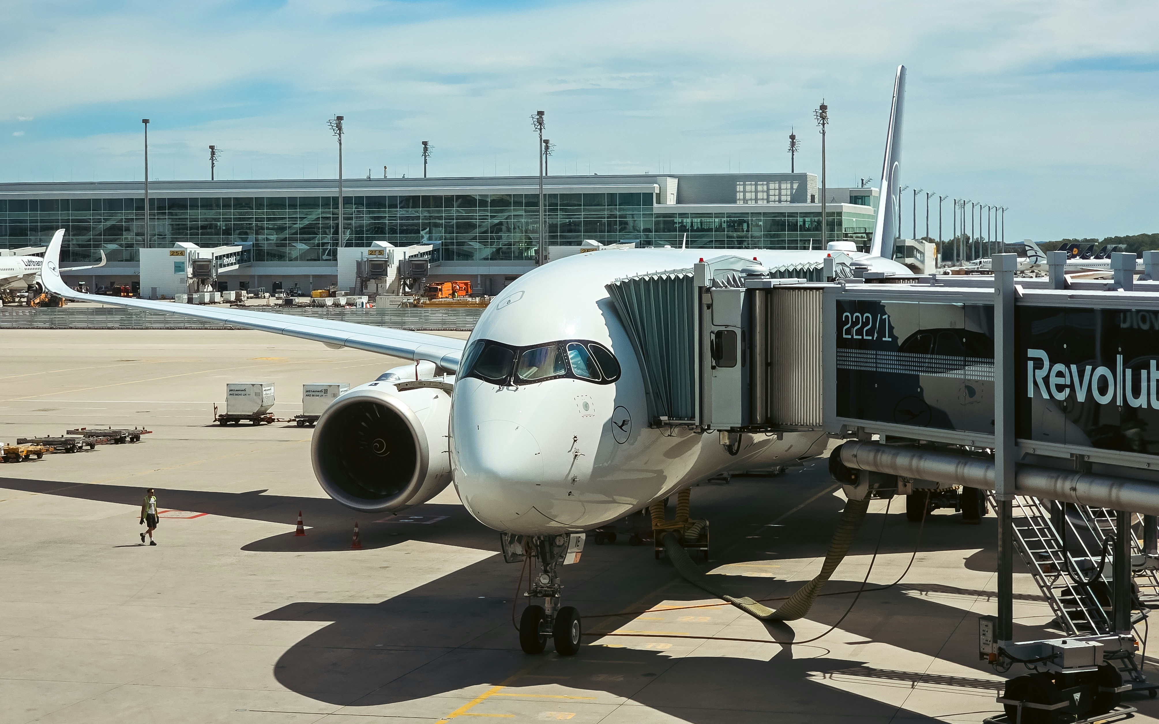 Narrow-Gap Departure: Jet at Gate with Jetway Extending to the Cabin