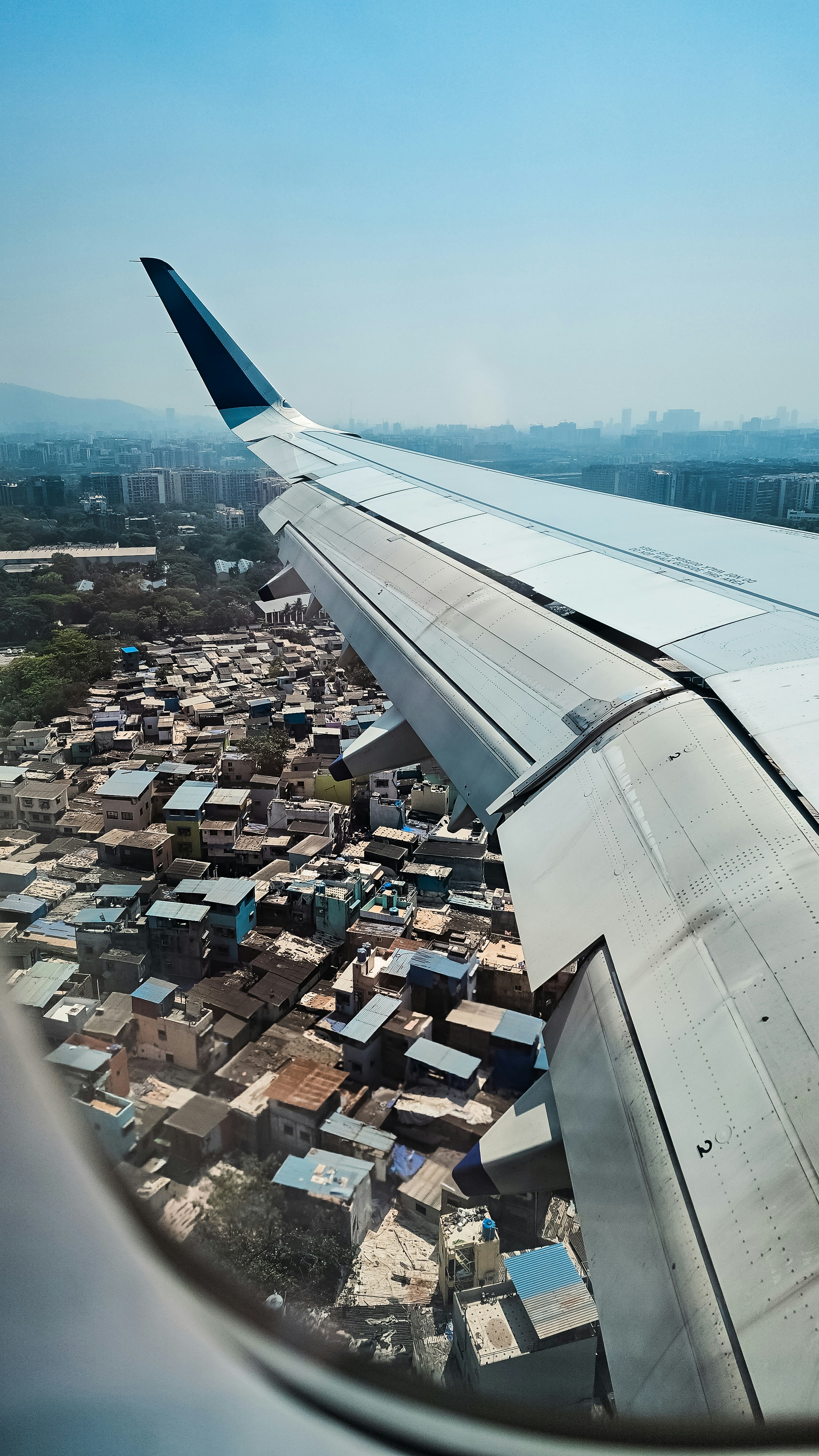 Wingliner Over Lagos: A City of Corrugated Quiet Below Turbulent Sky