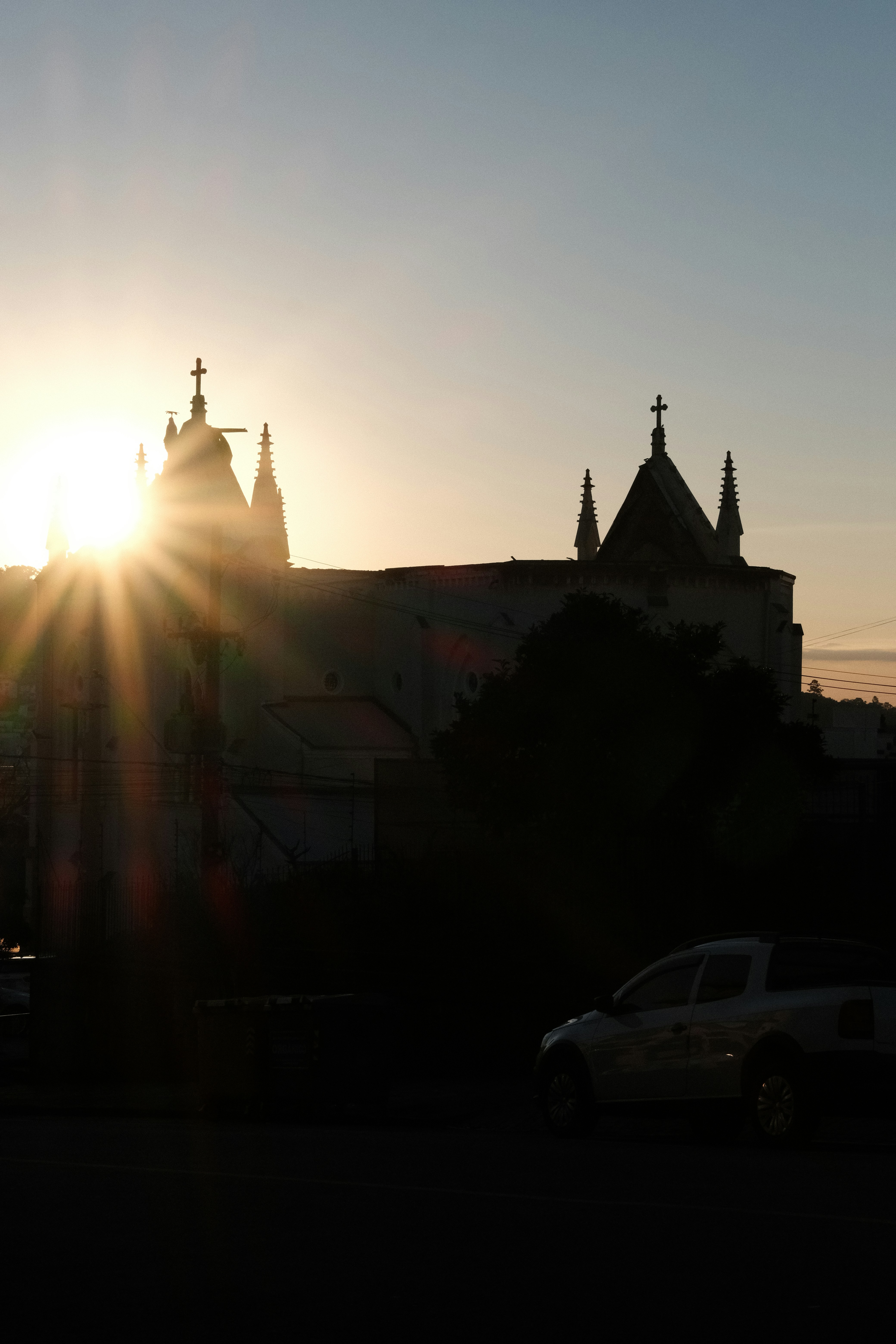 Sunburst Over Silent Spires at Dusk