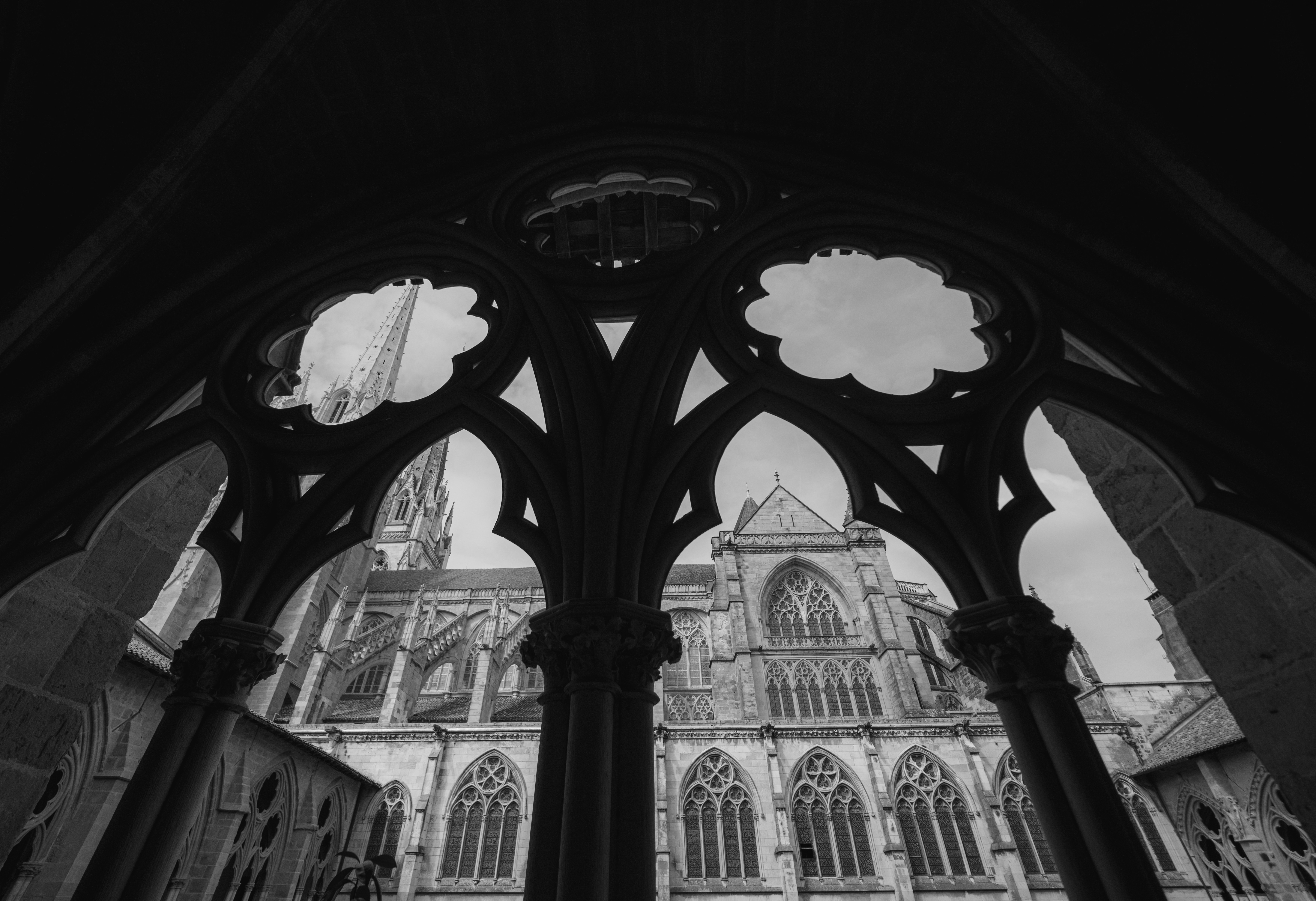 Gothic Arches: Viewer Drawn Through the Cloister Windows