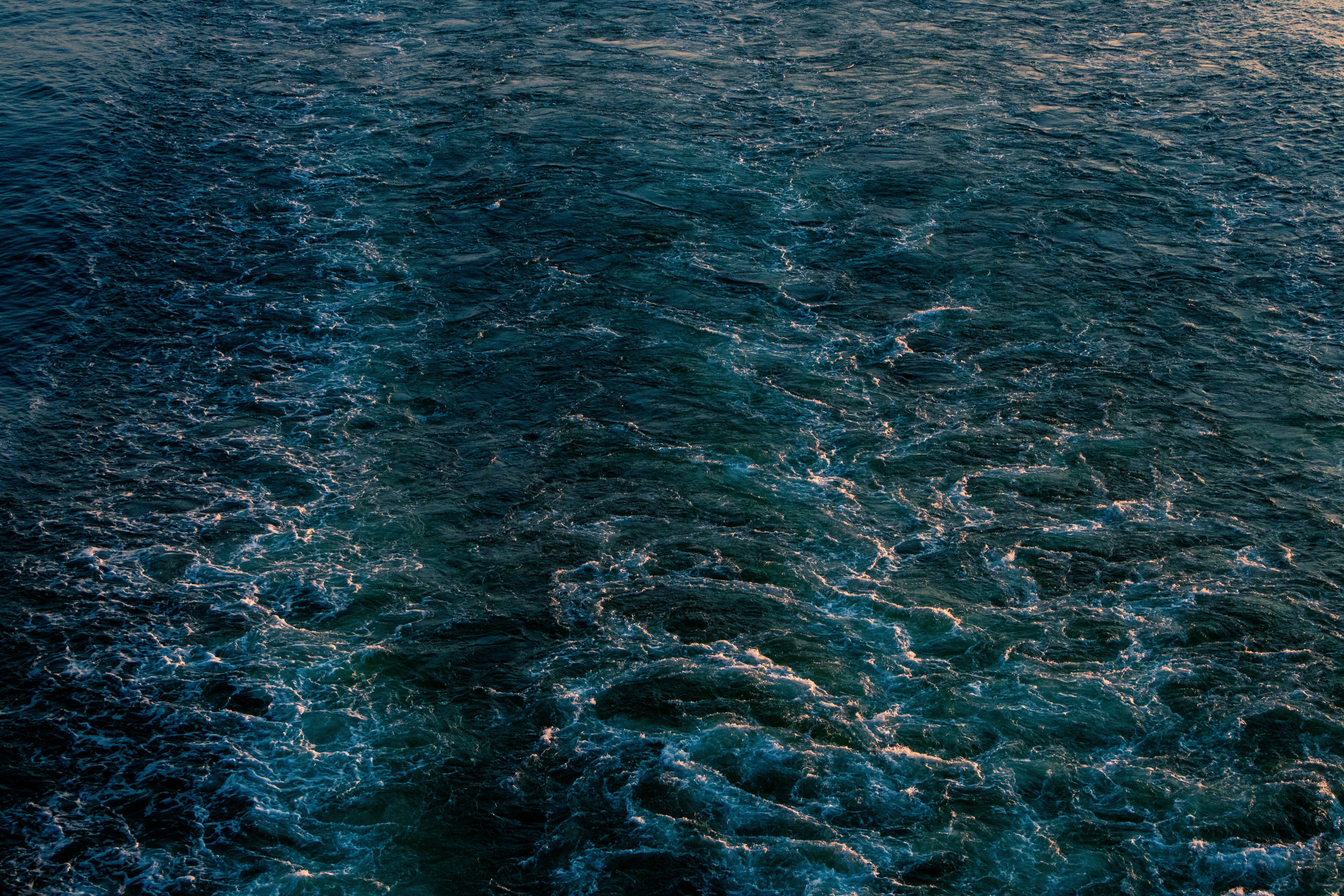 Churning Blue Currents from a Passage