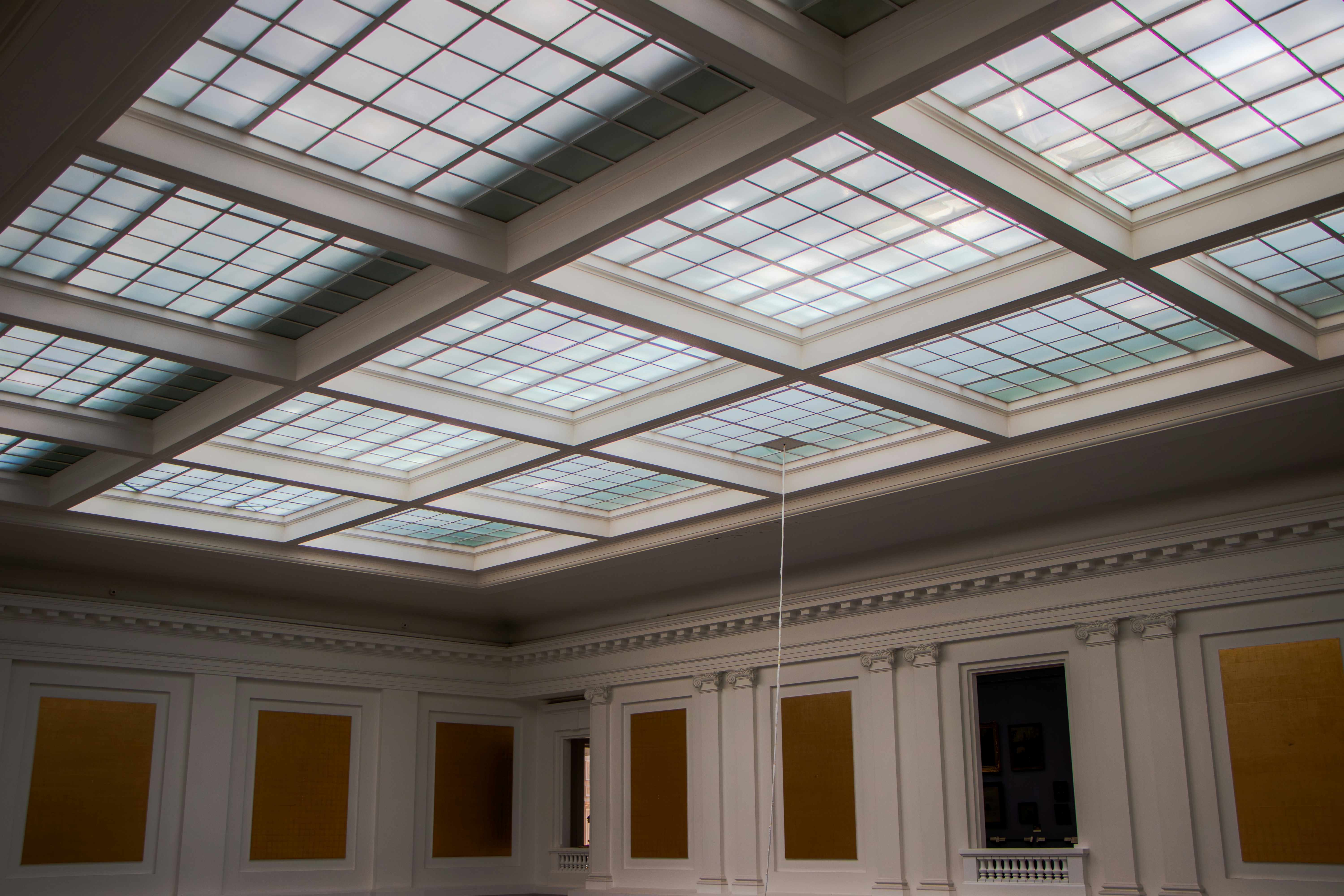 Geometric Glass Vault Over an Empty Gallery