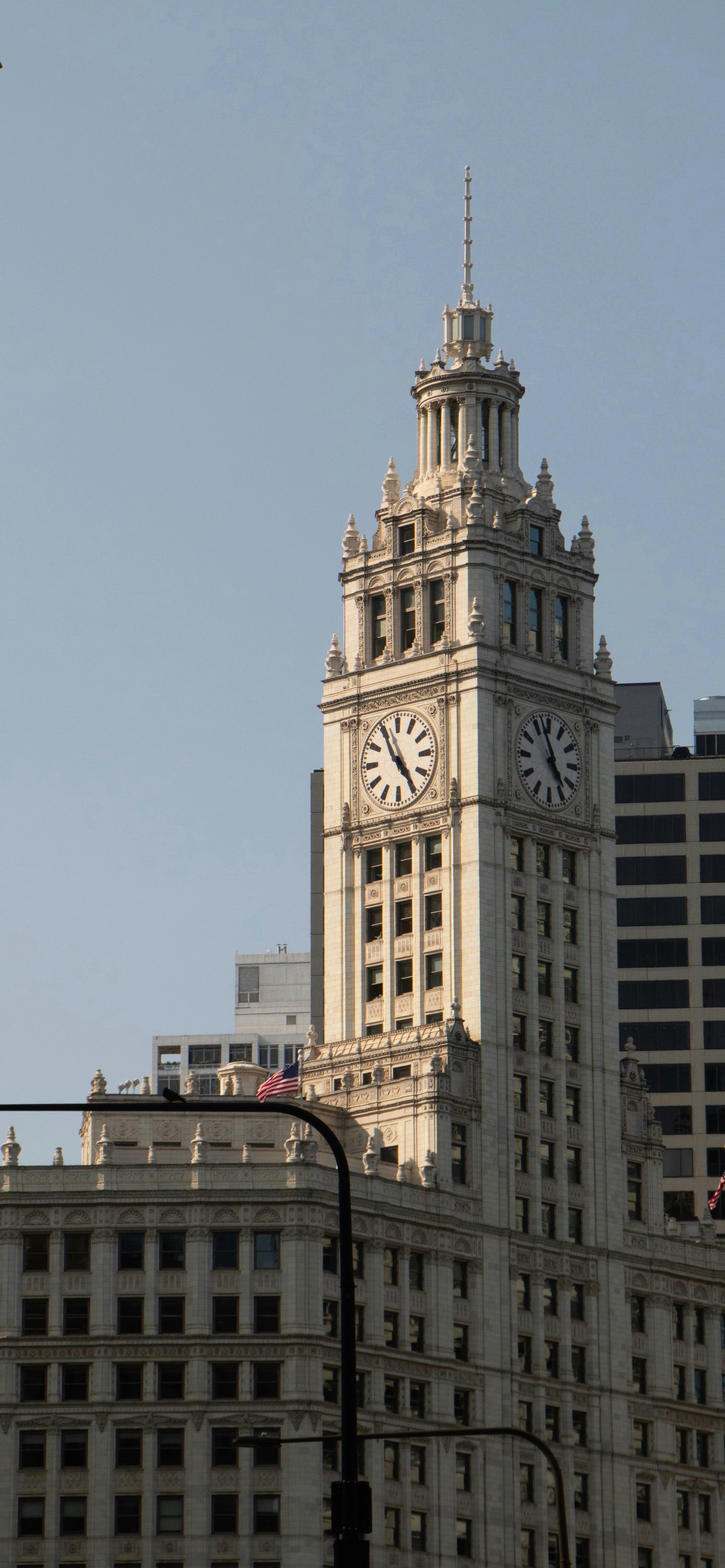 Timekeeper in the City: A Clock Tower Rising Above the Street