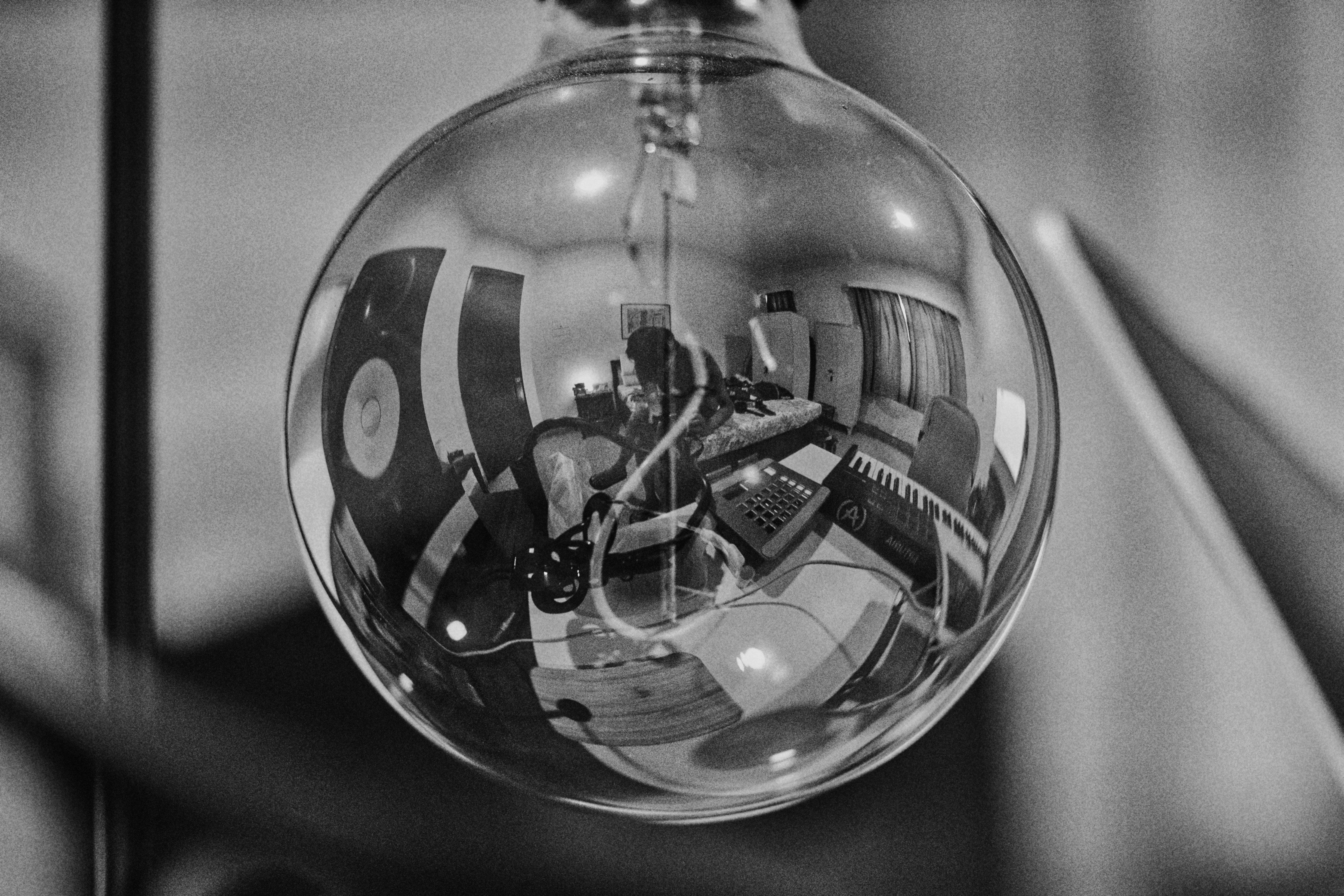 Inverted Studio Sphere: A Window into a Refracted Workspace