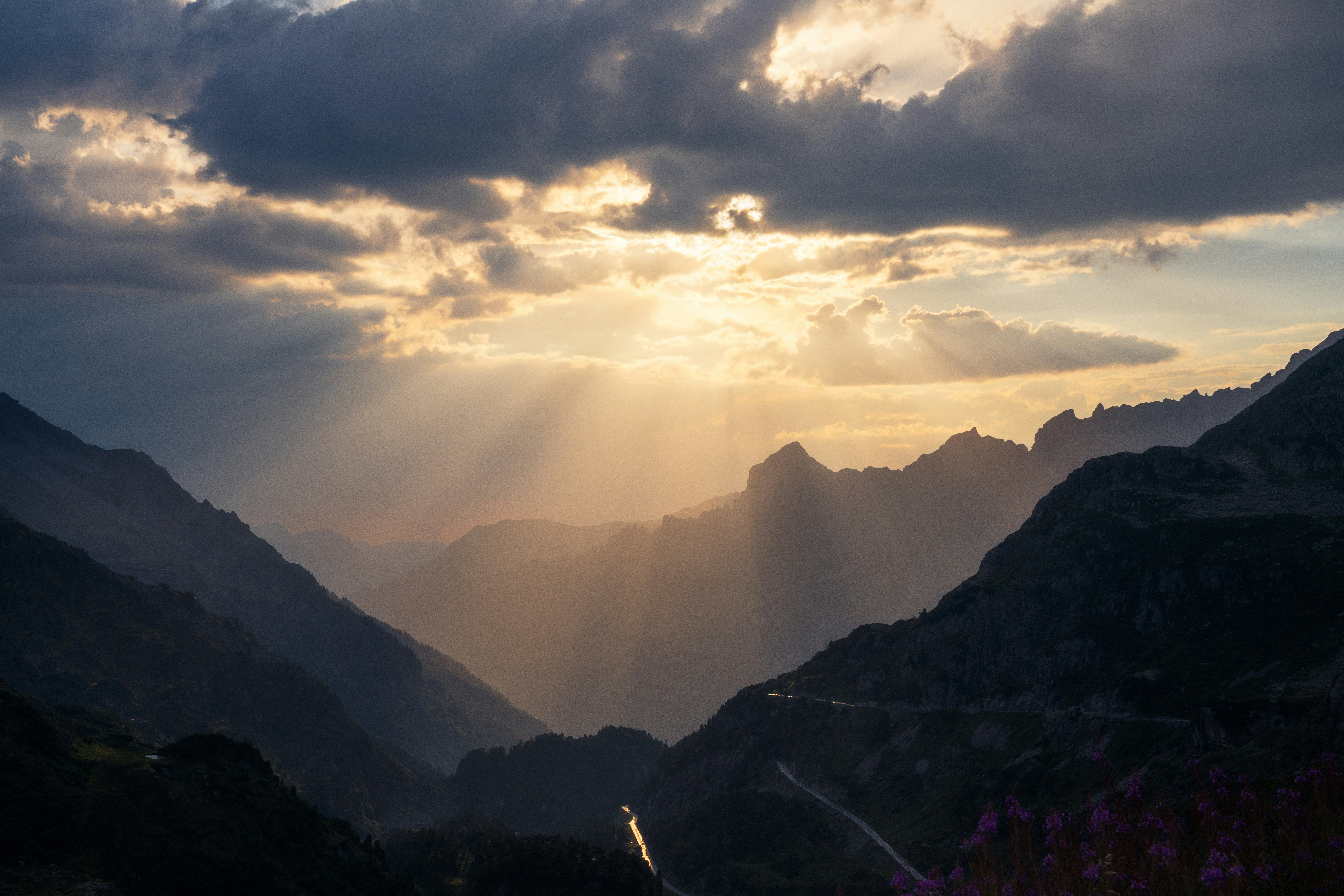 Sunbeams Through the Valleys: A Quiet Mountain Dawn