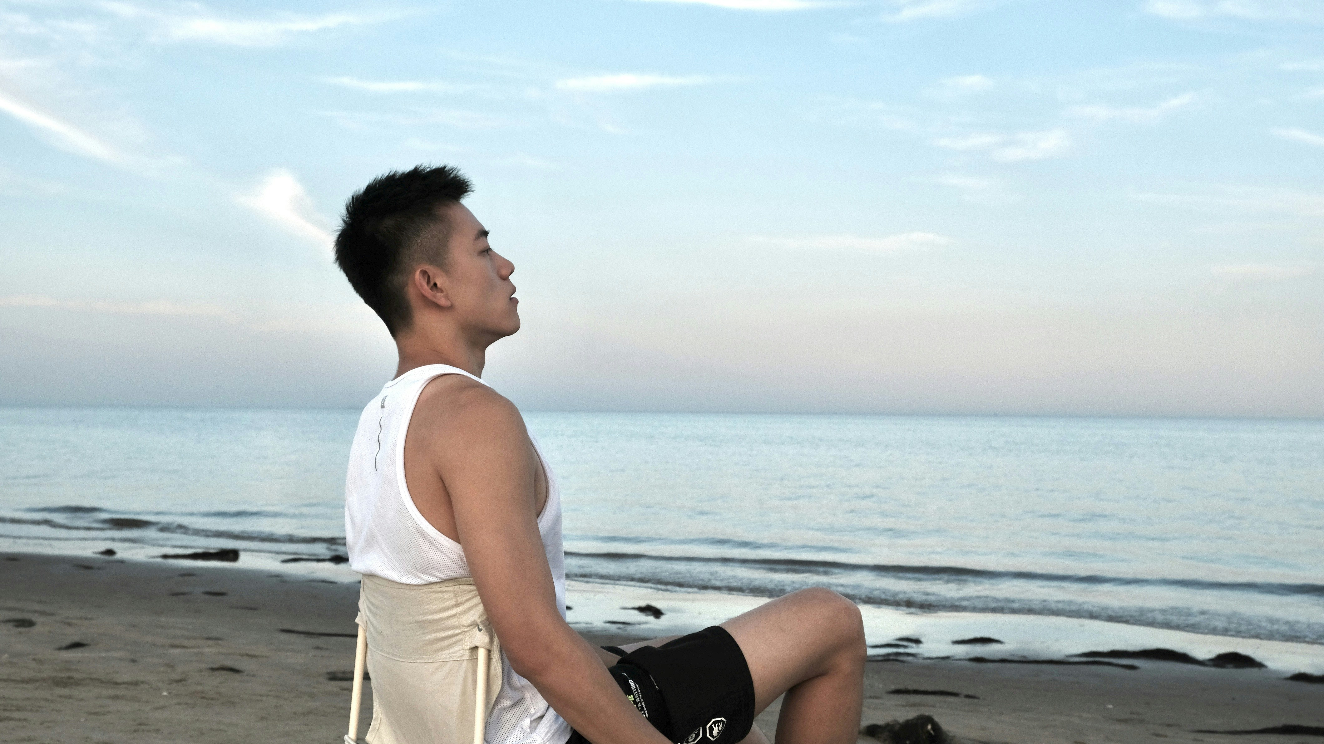 Coastal Pose: A Portrait of Quiet Confidence by the Sea