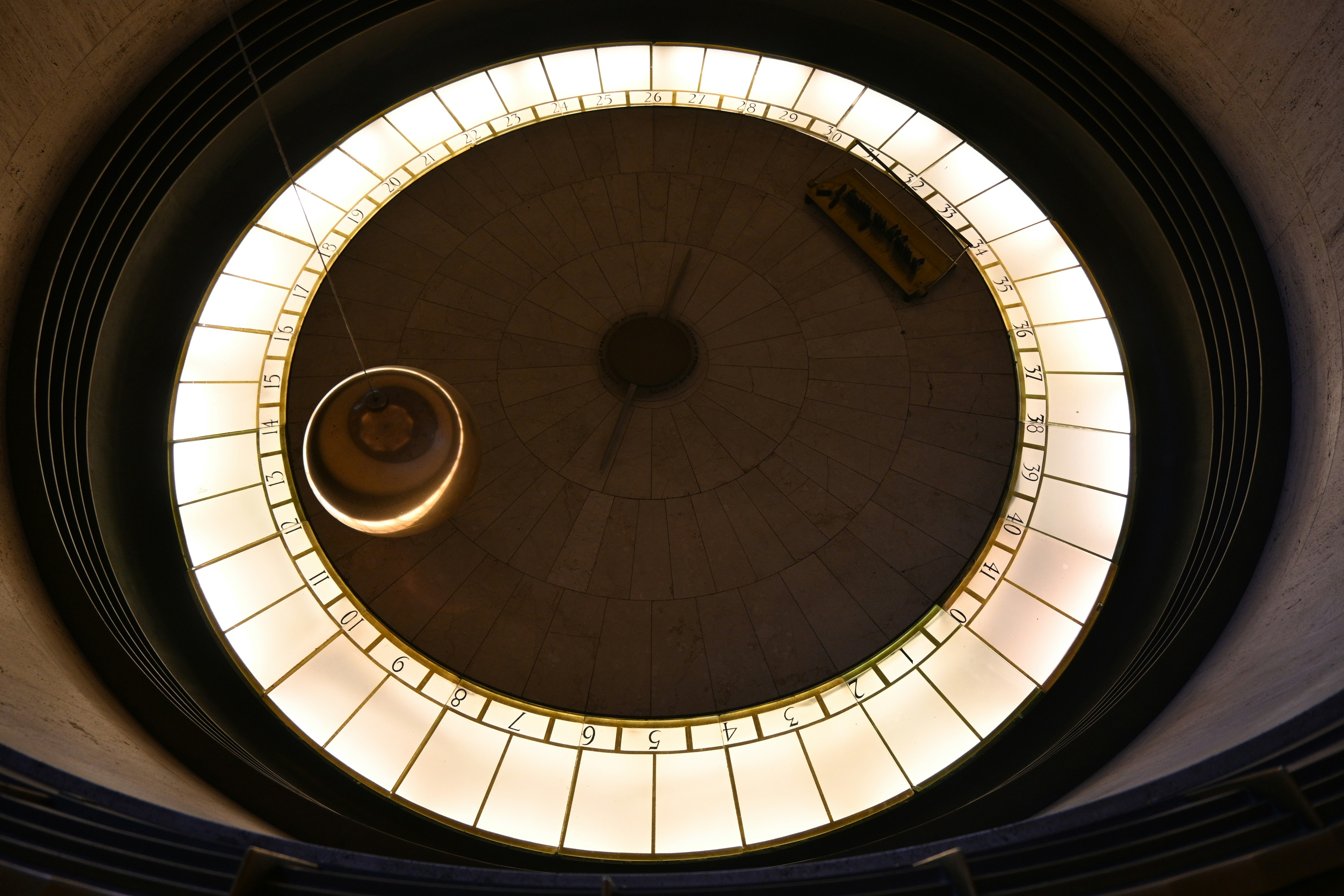 Circular Atrium Glow: A Neon Ring Encircling a Quiet Center