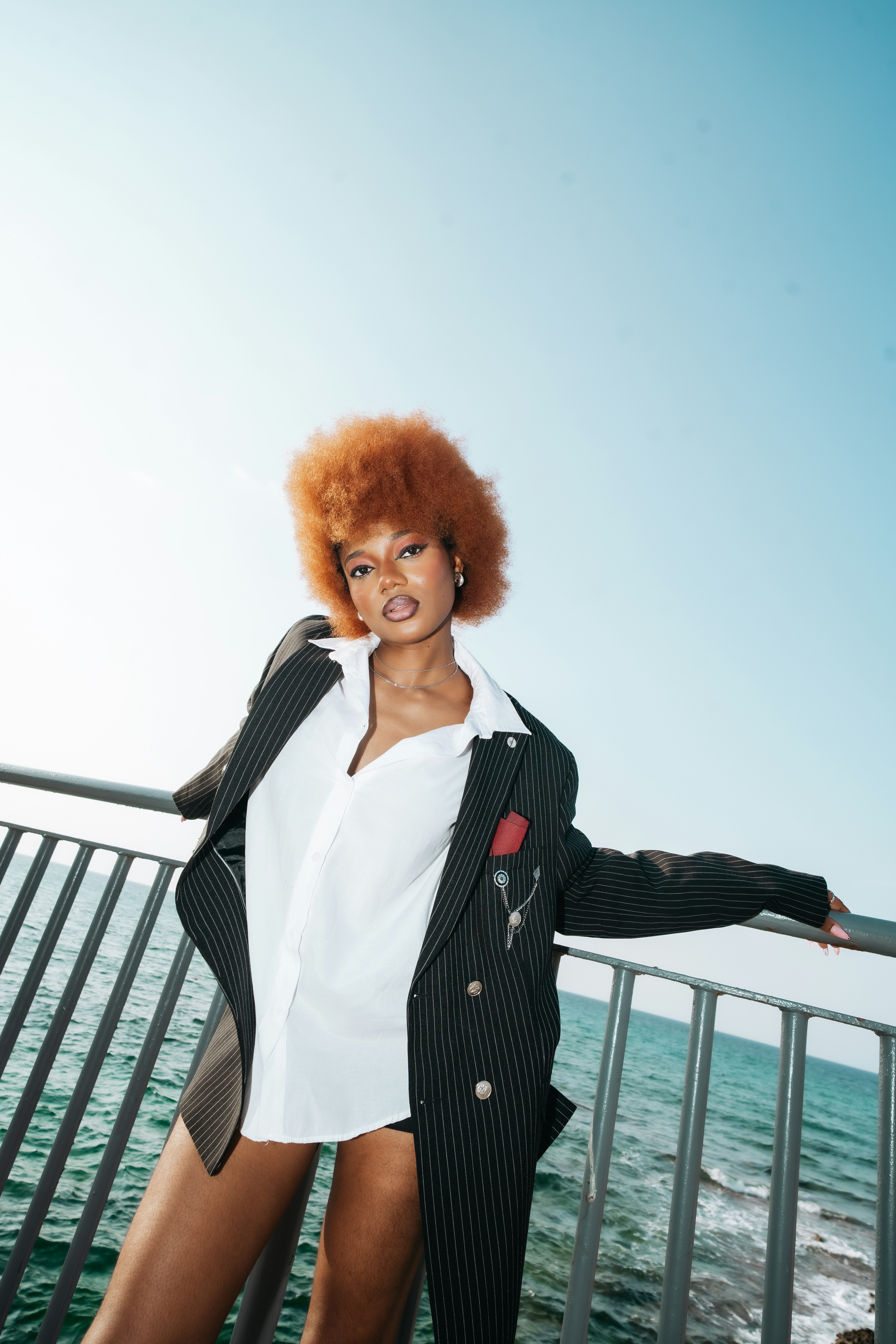 Coastal Confidence: A Stride Across the Balcony