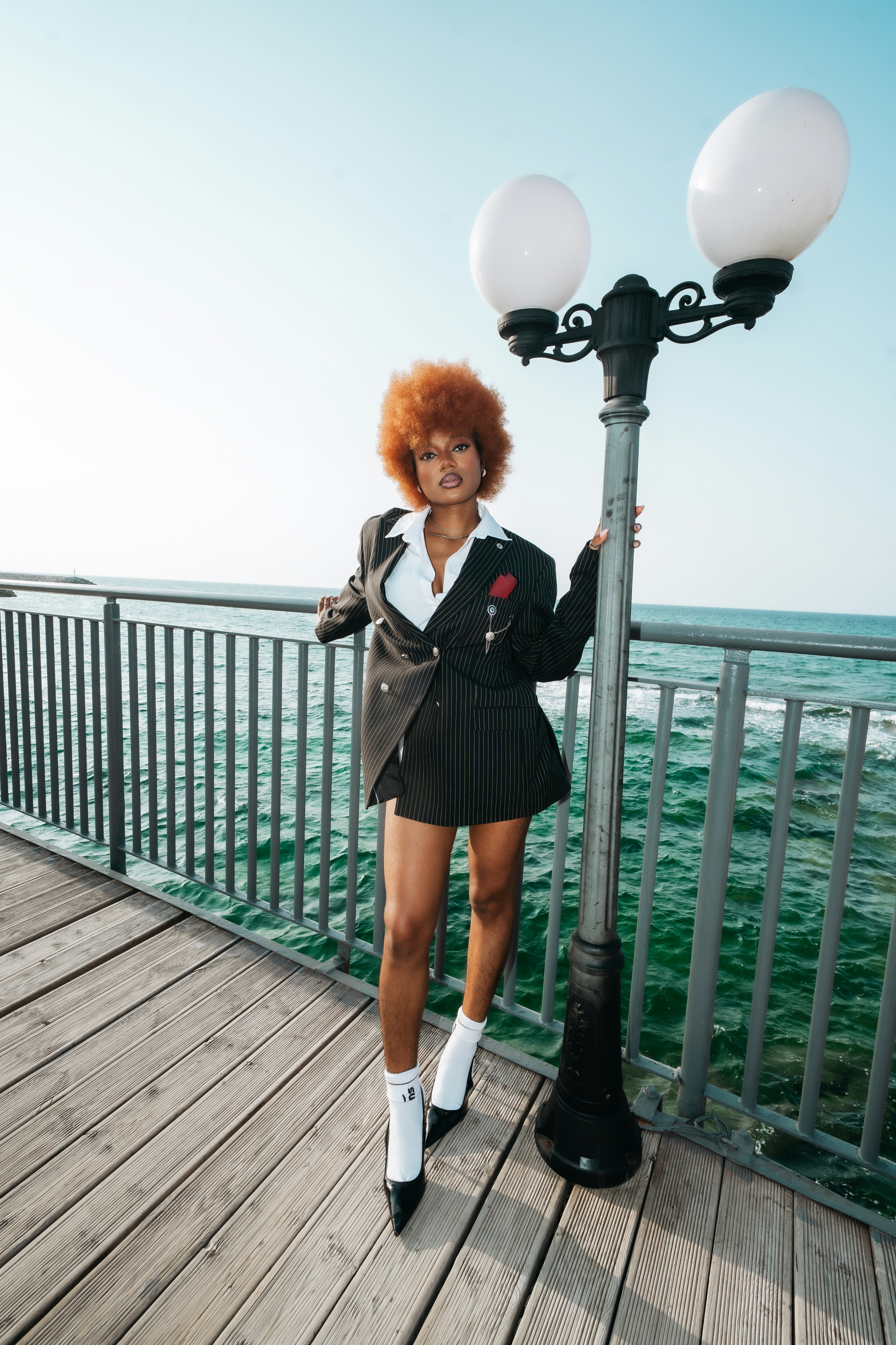 Bold Portrait on a Seaside Promenade