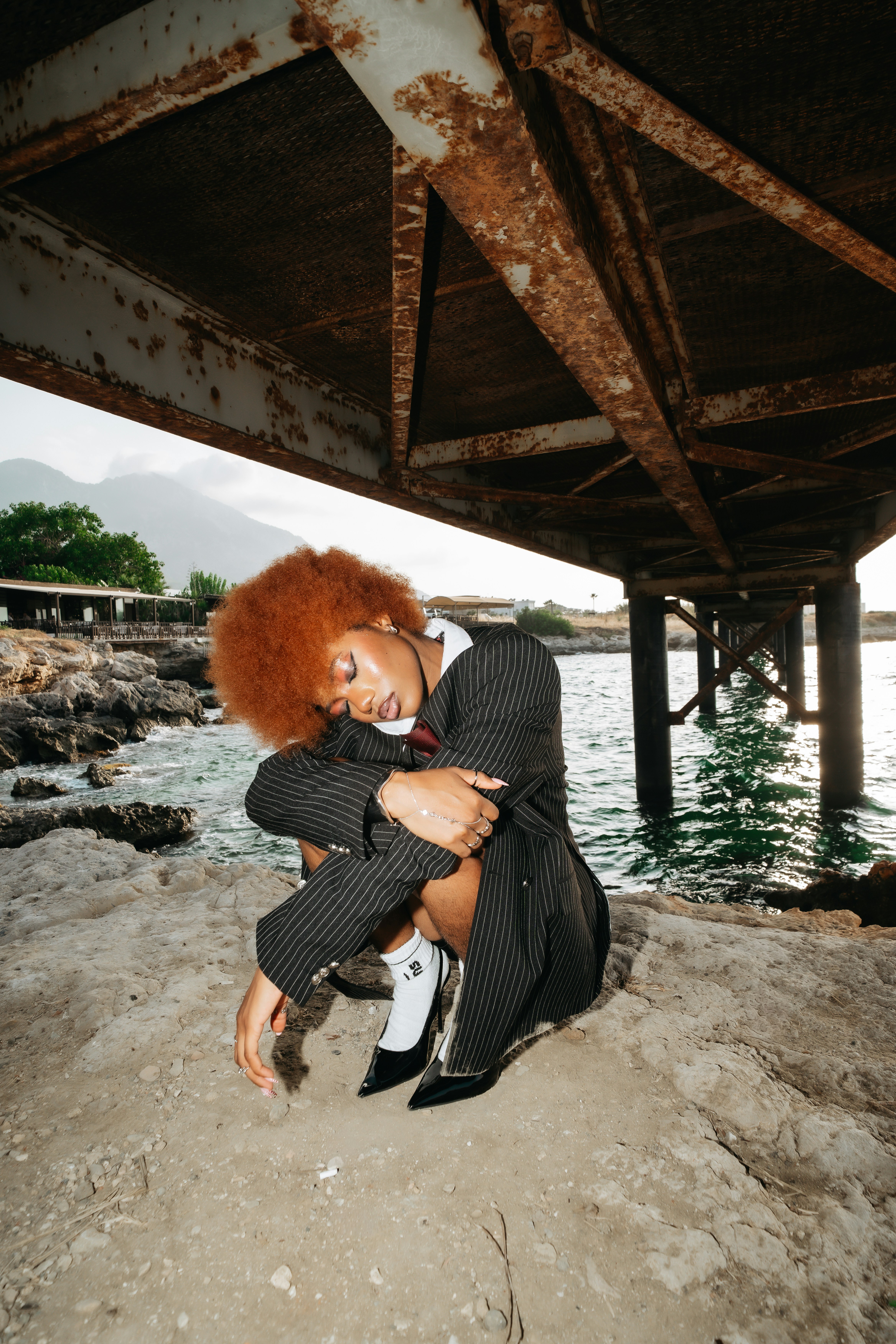 Under the Pier: Quiet Embrace by the Shore